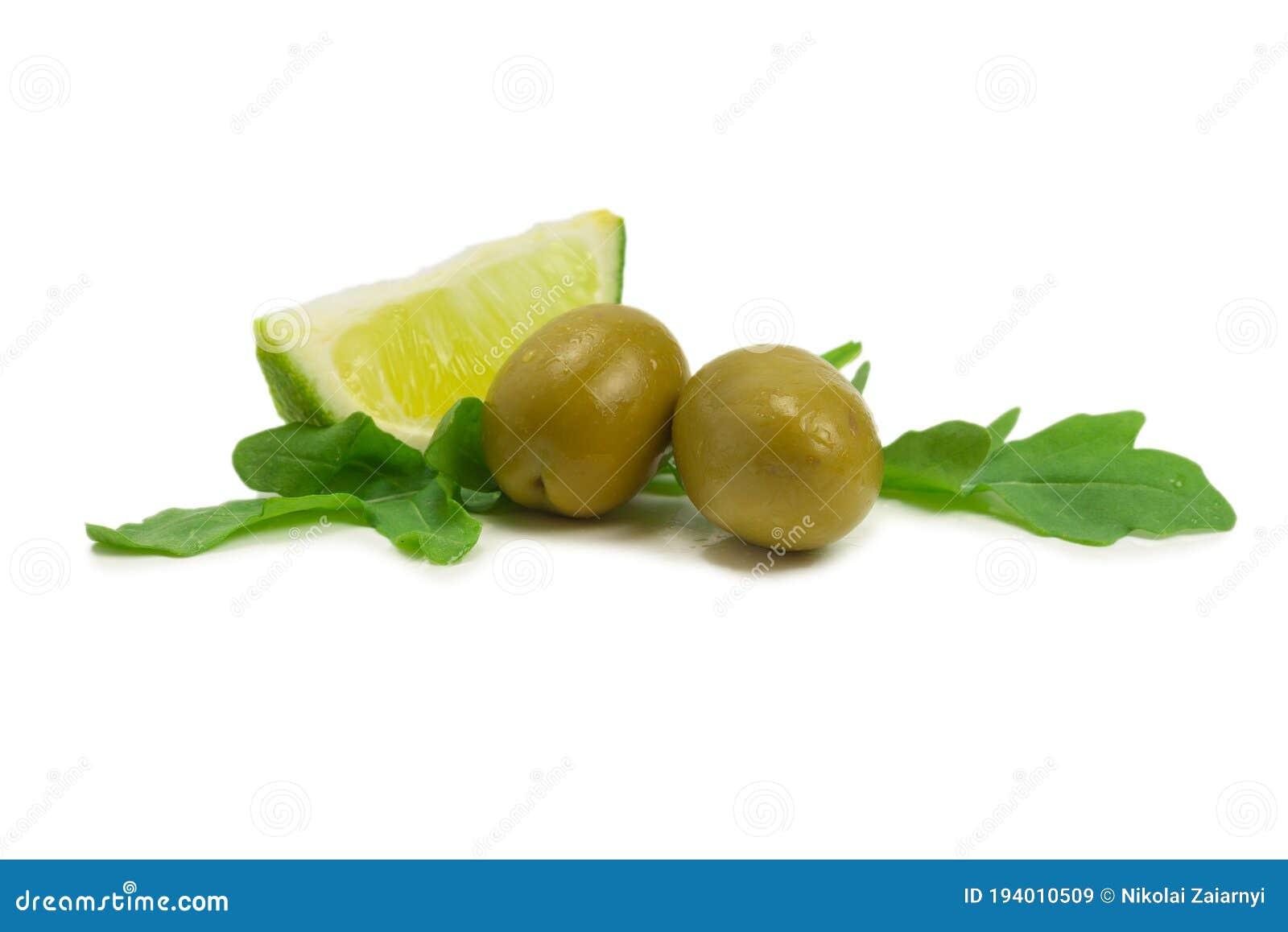 Two Olives, Piece of Lemon and Leaves of Arugula Isolated on White ...