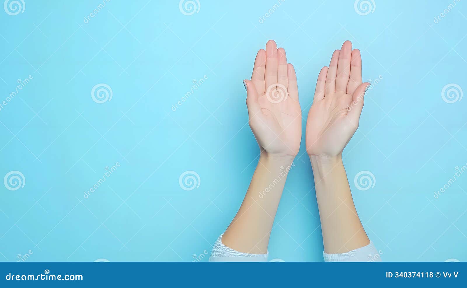 Two Open Hands Against a Light Blue Background Stock Photo - Image of ...