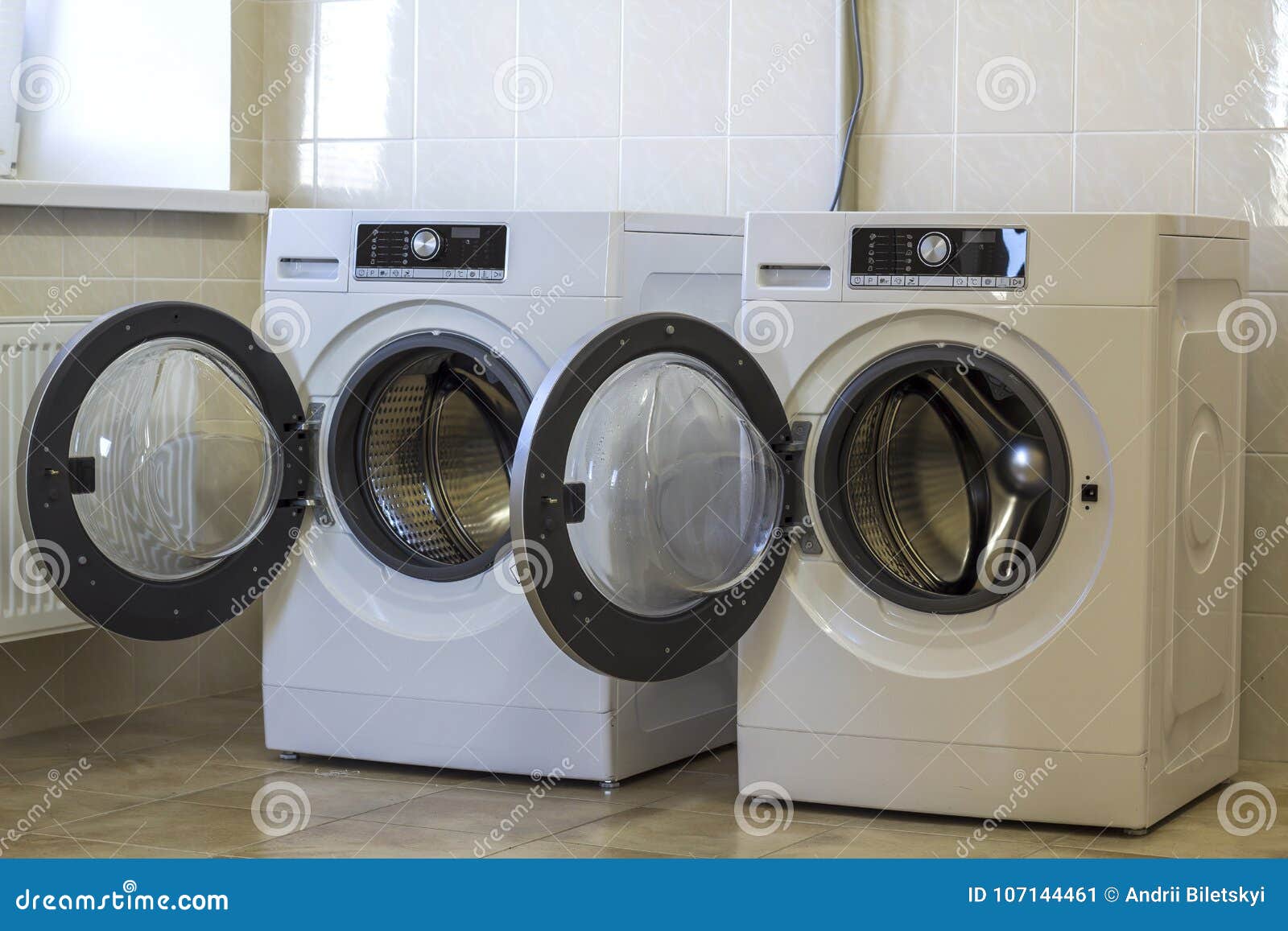 Two Open Washing Machines in Bathroom Stock Image - Image of front ...