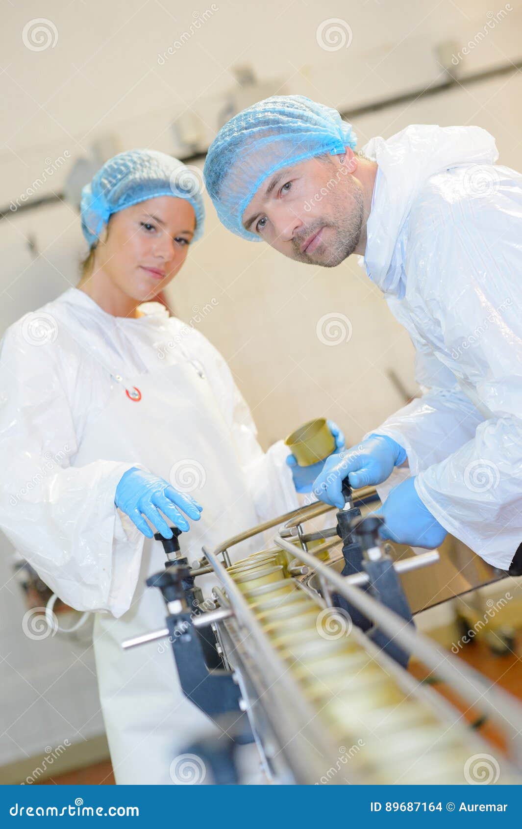 Two Operatives Working on Conveyor Line Stock Photo - Image of ...