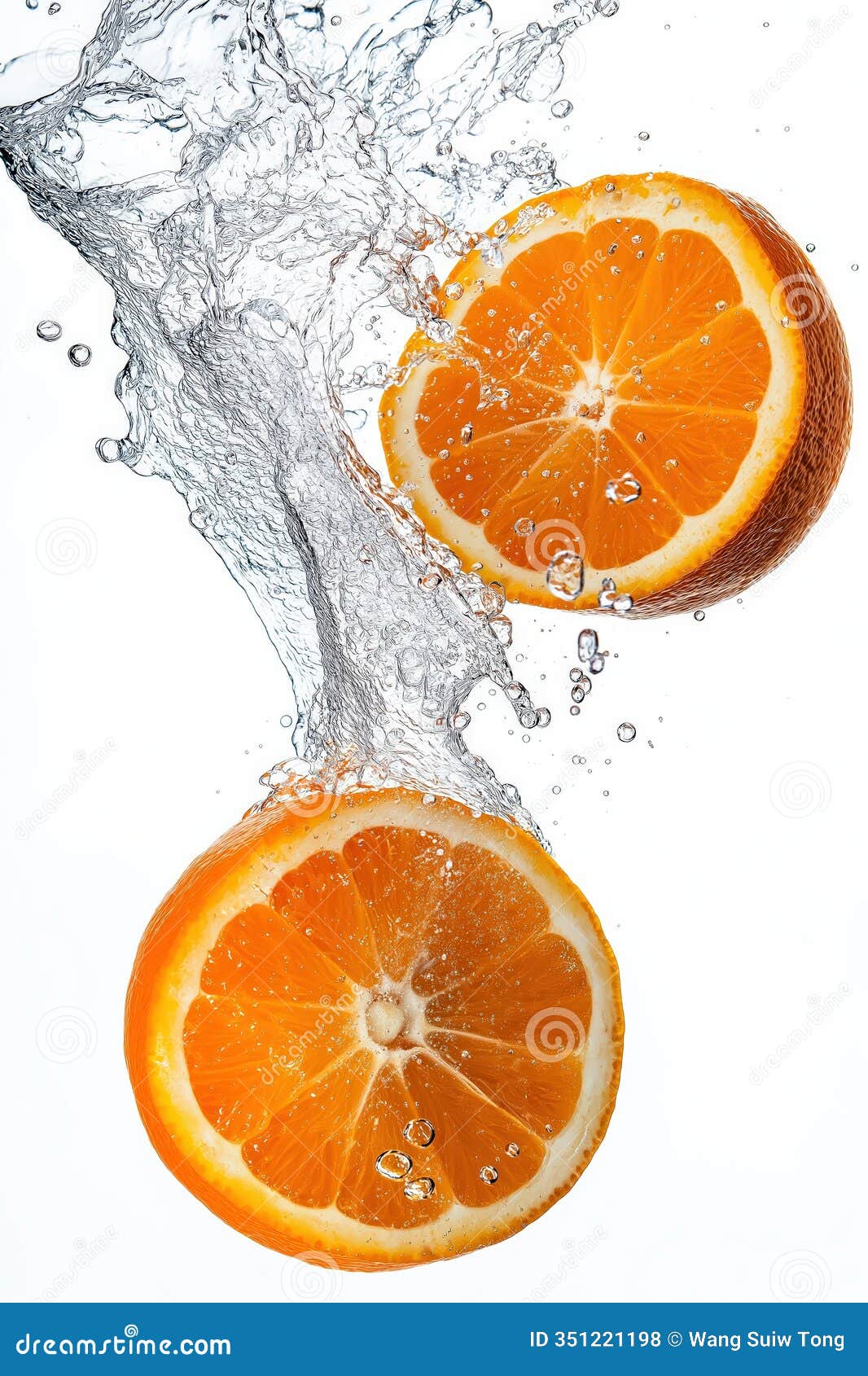 Two Orange Halves Splashing into Water on White Background Stock ...