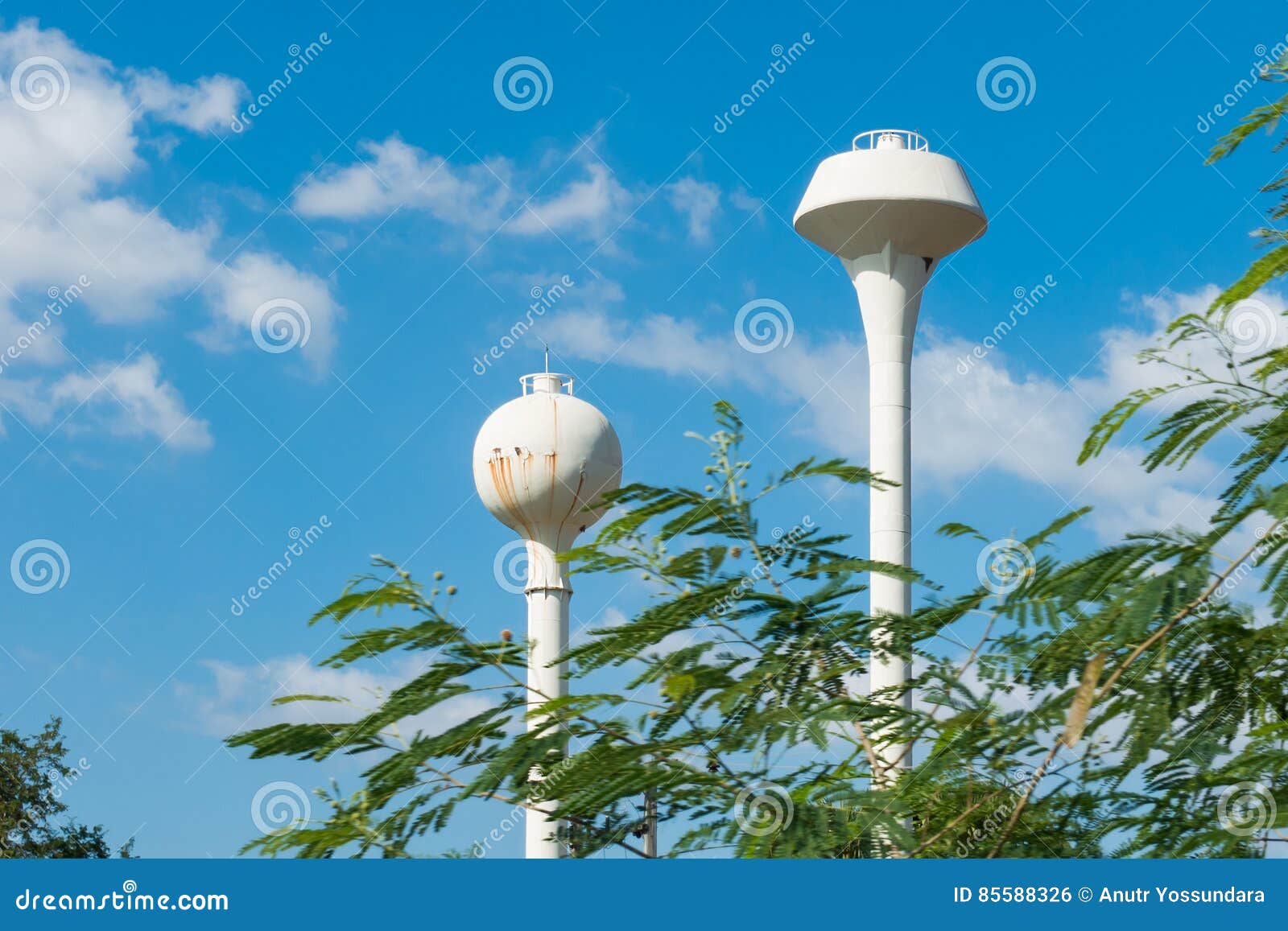 Two outdoor water towers stock photo. Image of blue, background - 85588326