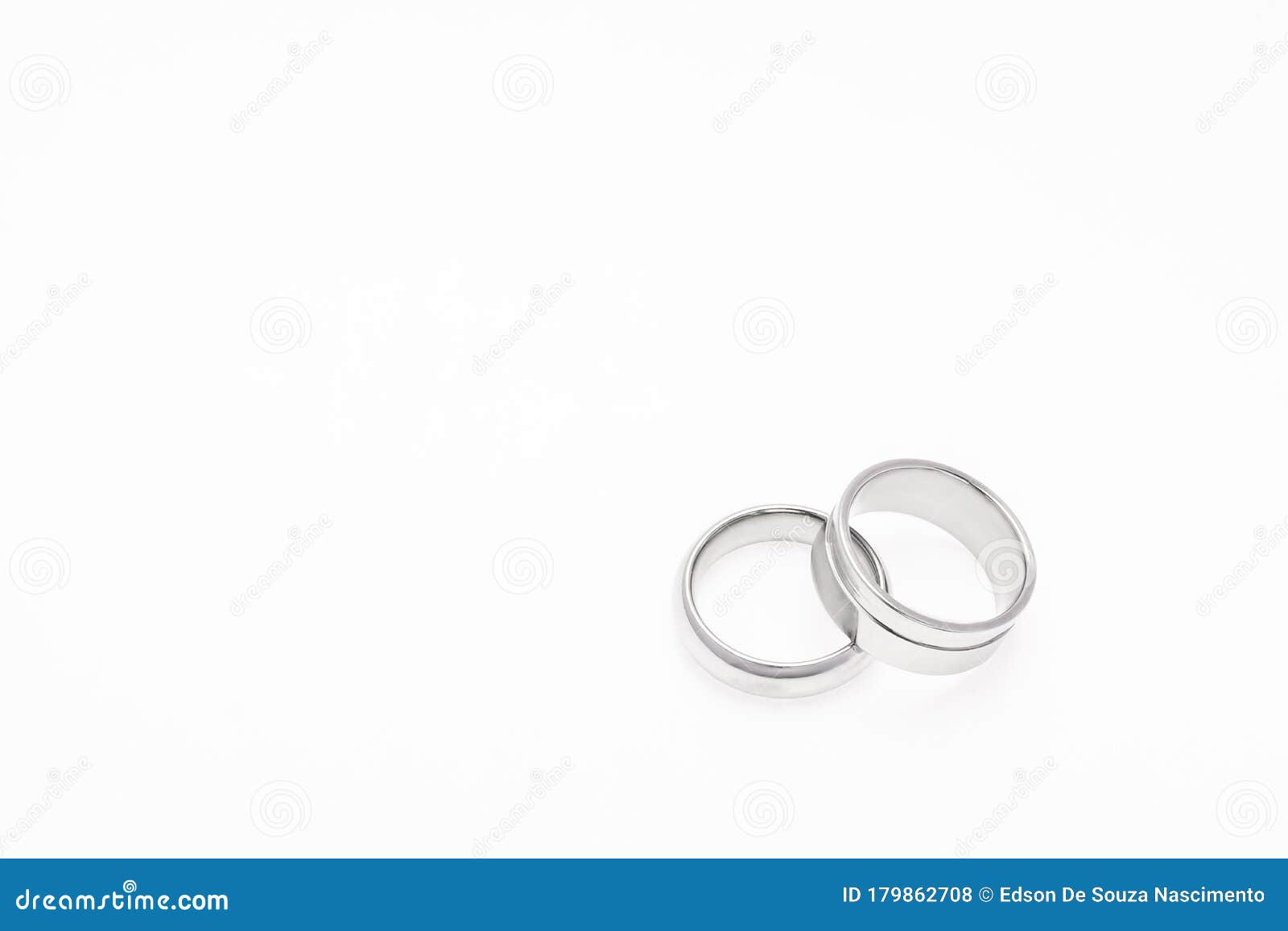 Two Overlapping Silver Wedding Rings Stock Photo - Image of luxury ...