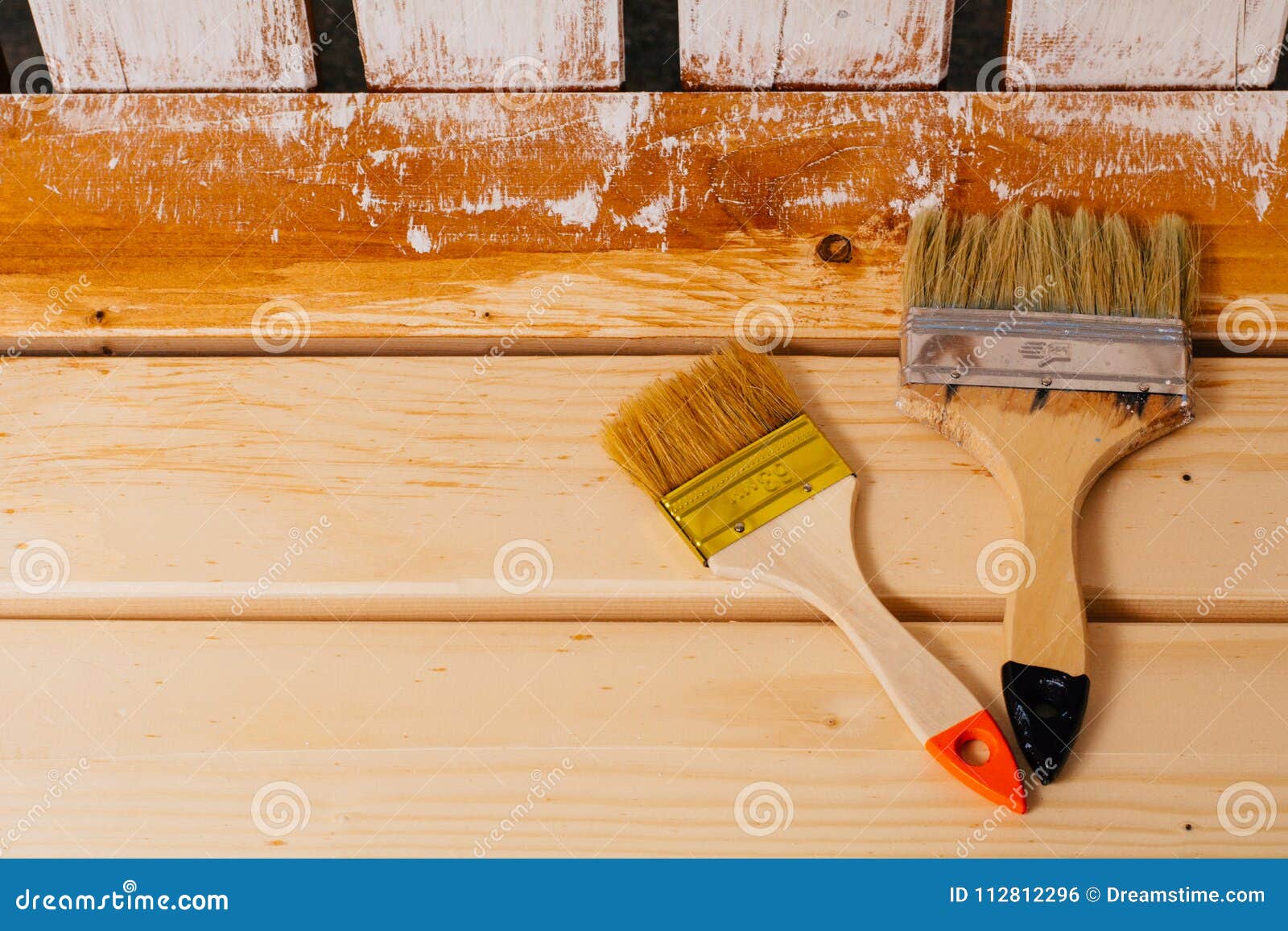 Two Paint Brushes Lying on Painted Partly Slatted Surface Stock Photo ...