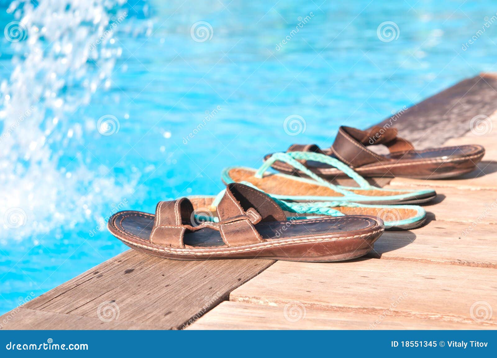 Two Pairs of Flip-flops by the Swimming Pool Stock Image - Image of ...