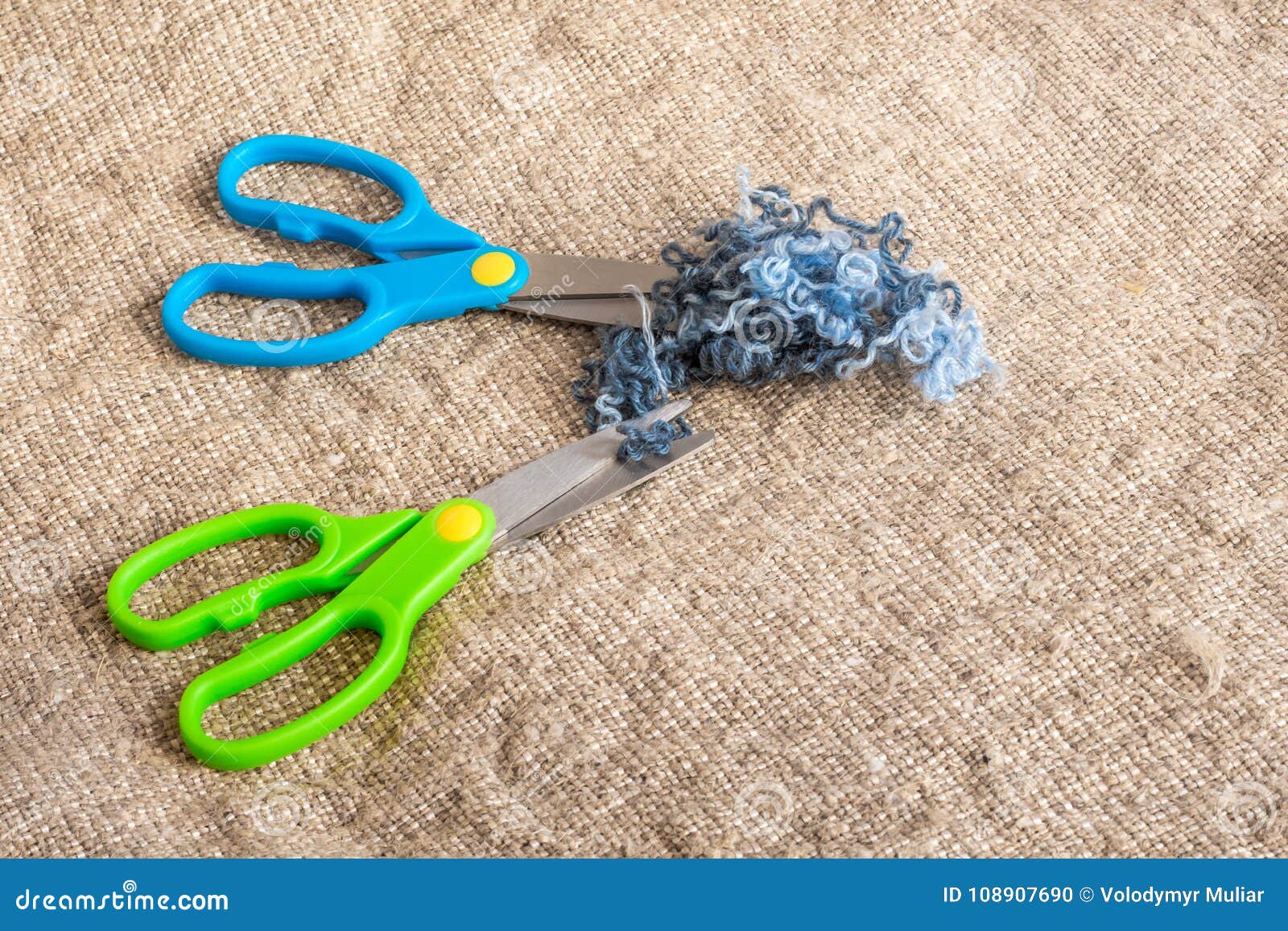 Two Pairs of Scissors of Blue and Green with a Bundle of Threads Stock ...
