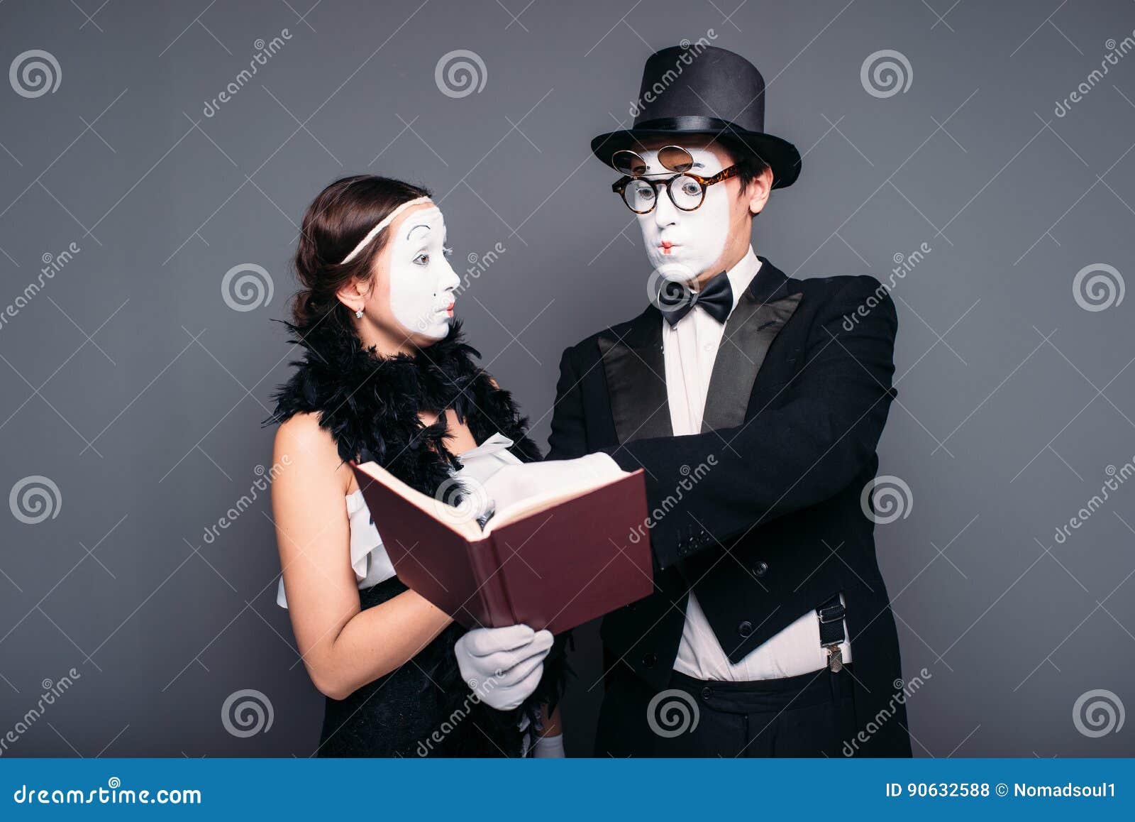 Two Pantomime Theater Performers Posing with Book Stock Photo - Image ...