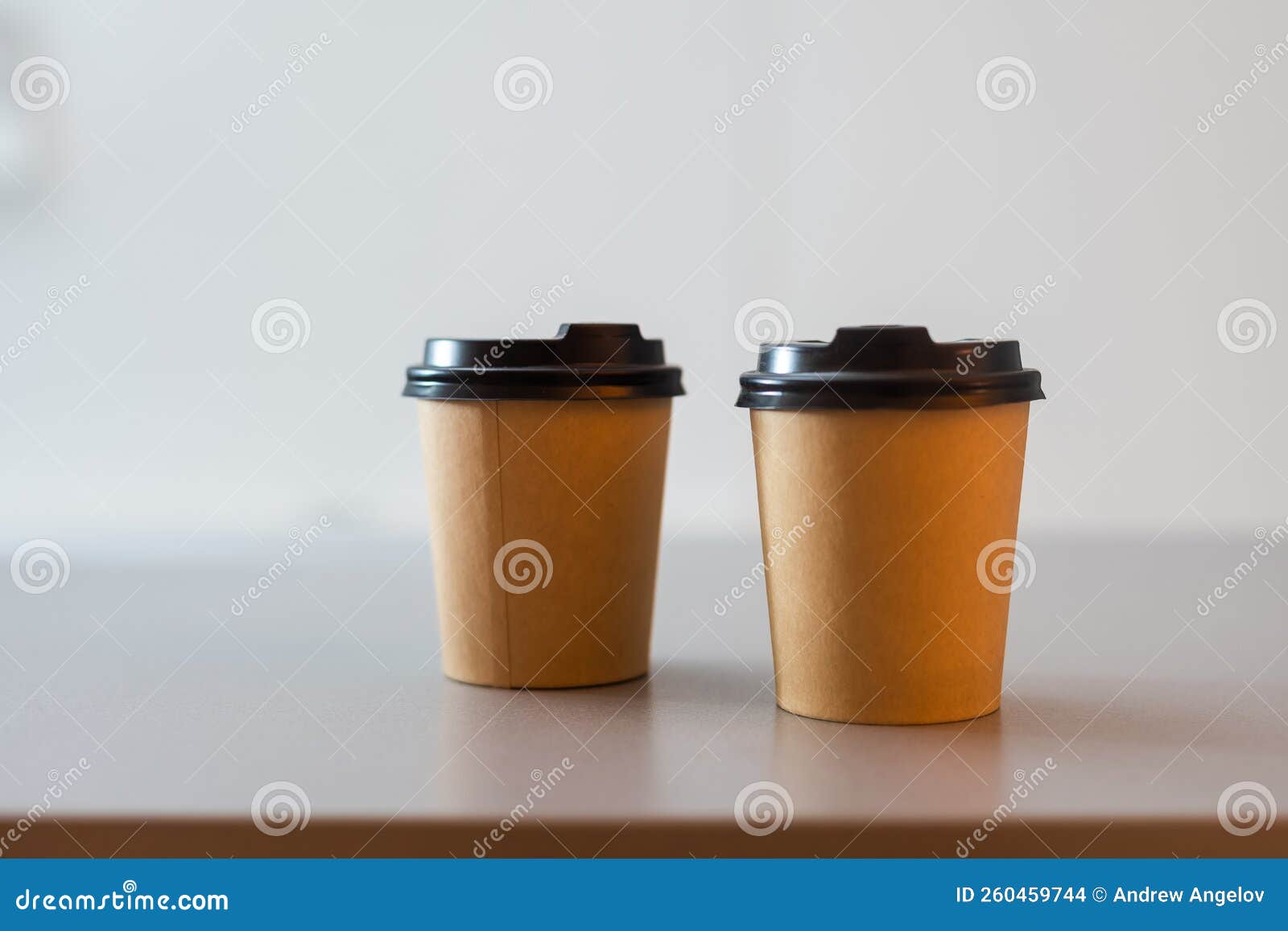 Two Paper Coffee Cups on a Table Stock Photo - Image of brown, paper ...
