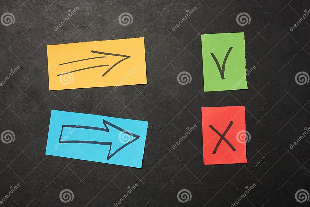Two Paper Sheets with Drawn Check Mark and Cross Symbols, Representing ...