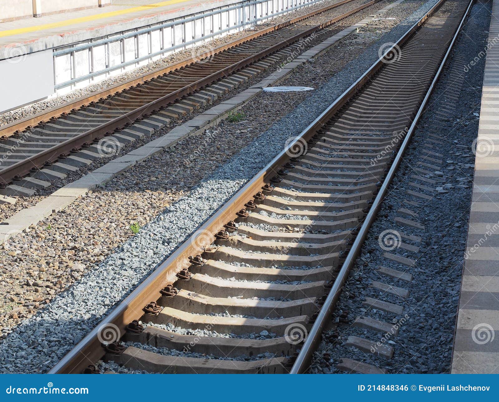 Two Parallel Railways Illuminated by the Sun S Rays are Narrowing in ...