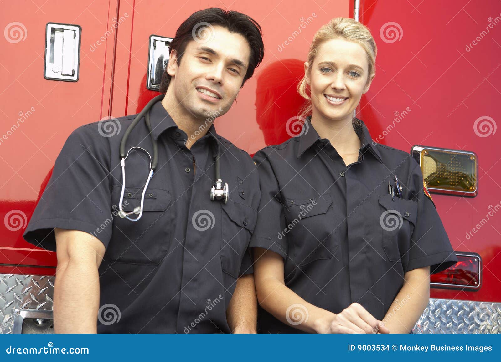 Two Paramedics Laughing Together Stock Photo - Image of doctor, crew ...
