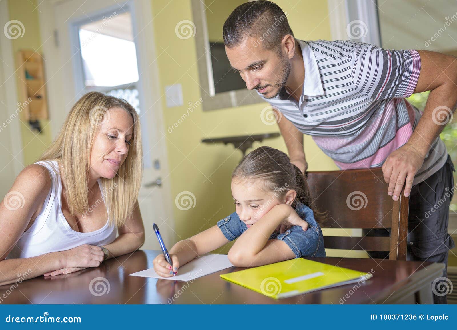 Parents Helping Son with Homework in Home Interior Stock Photo - Image ...