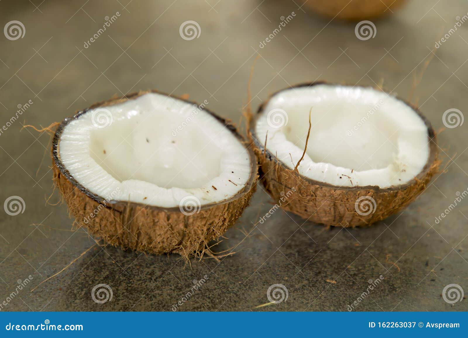 Two Parts on Cracked Coconut on the Ground Stock Image - Image of ...