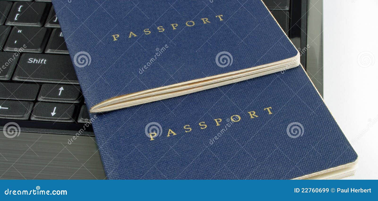 Two passports and computer stock image. Image of communication - 22760699