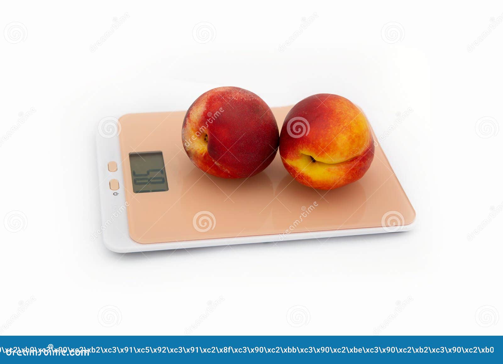 A Two Peach on a Kitchen Scale on a White Background. the Concept of ...