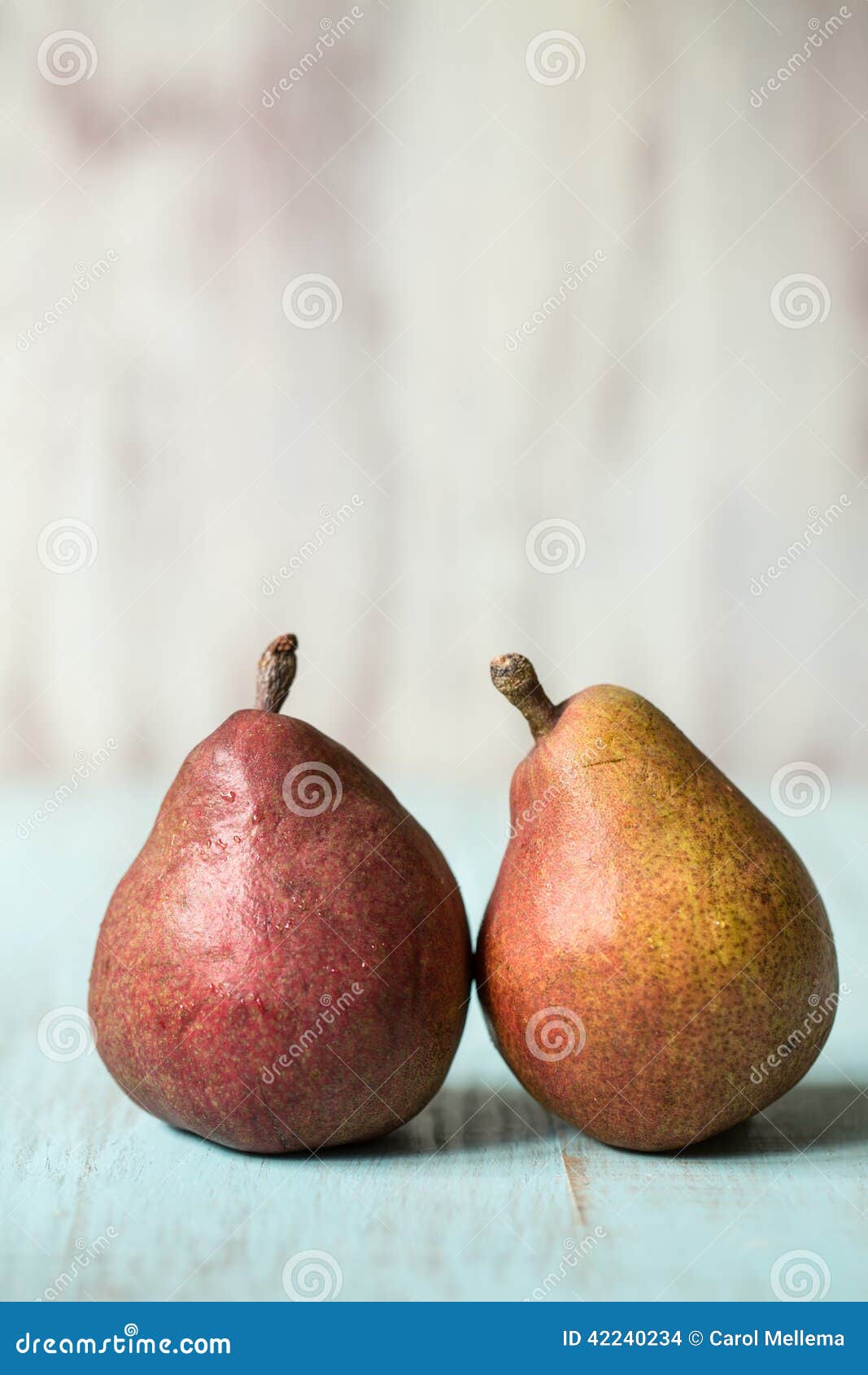 Two Pears on Blue Wood Table Stock Photo - Image of healthy, juicy ...