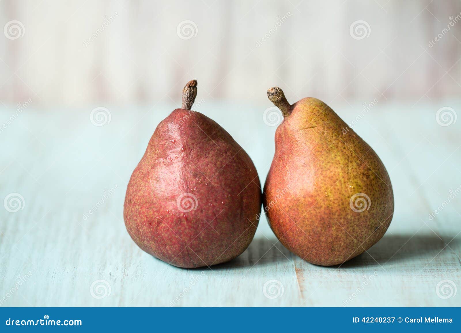 Two Pears on Blue Wood stock image. Image of organic - 42240237