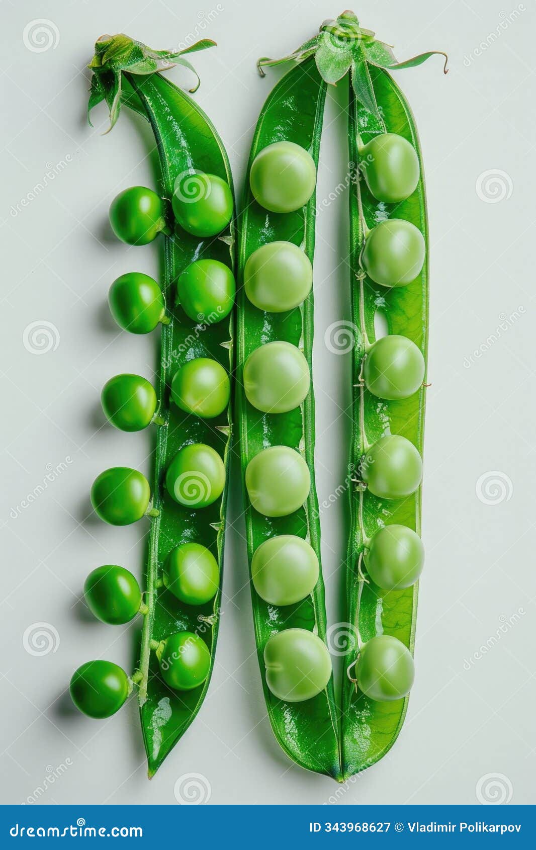 Two Peas Sitting Together on a Surface, Possibly in a Row or on a Plate ...