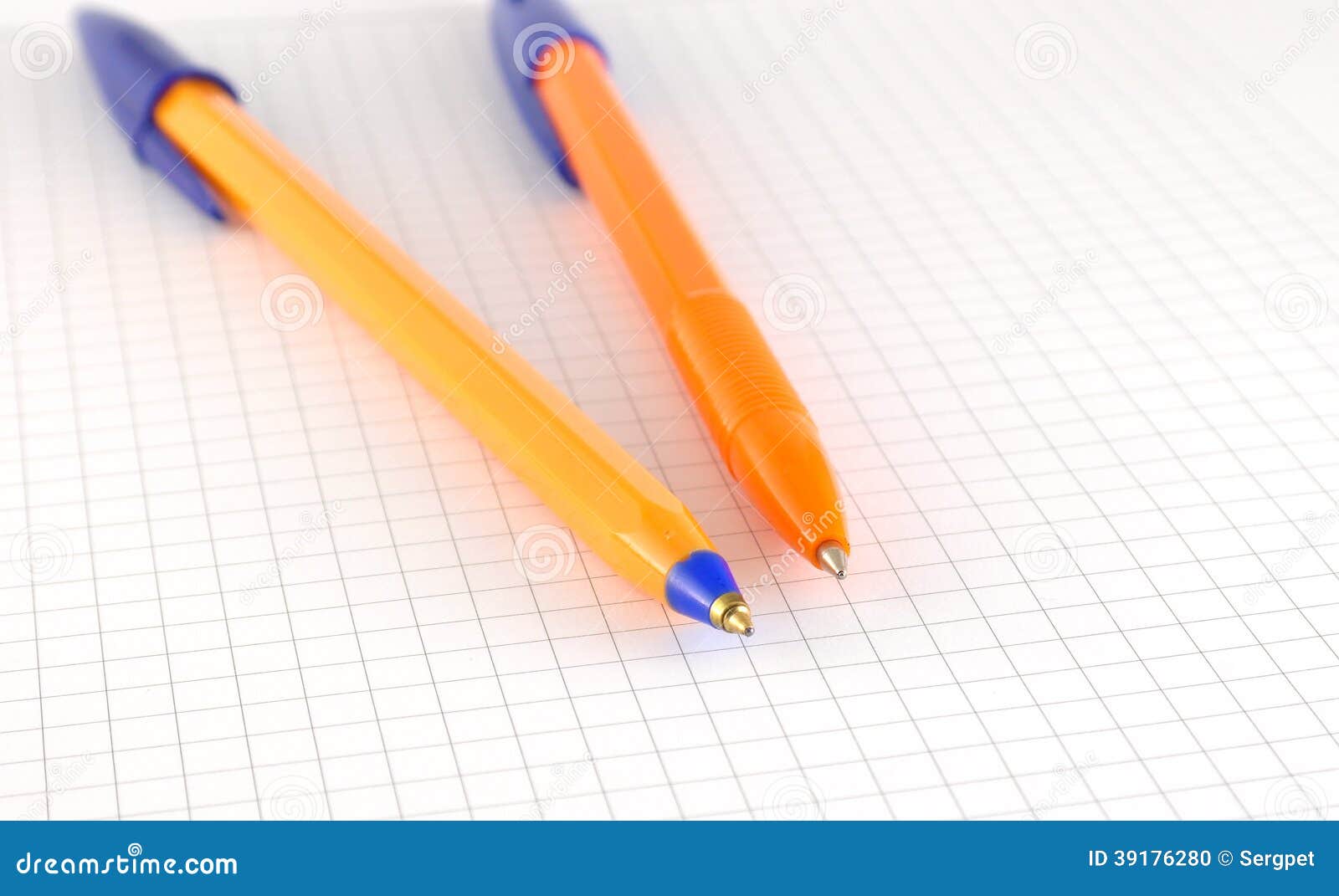 Two Pen on the Checked Paper Stock Photo - Image of back, paper: 39176280