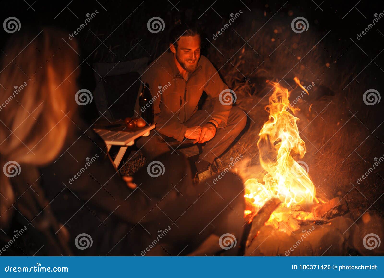 Two People Around a Campfire at Night Stock Photo - Image of flame ...