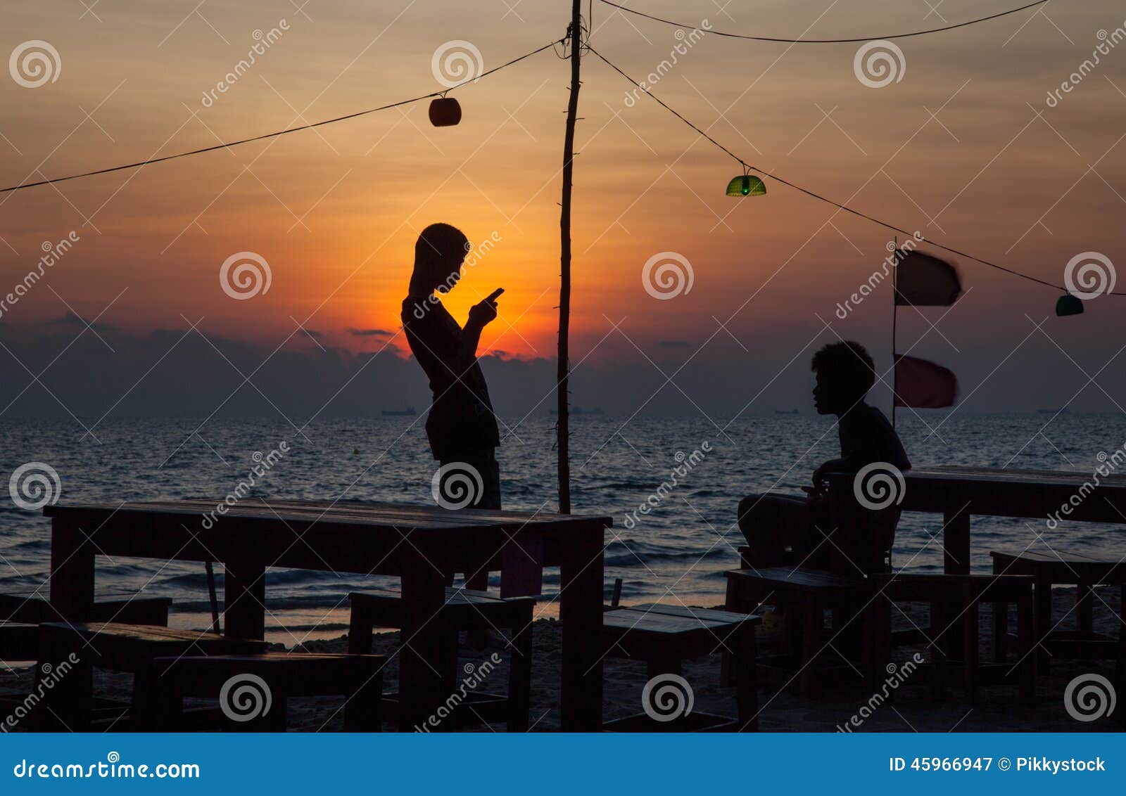 Two people on the beach stock image. Image of close, connection - 45966947