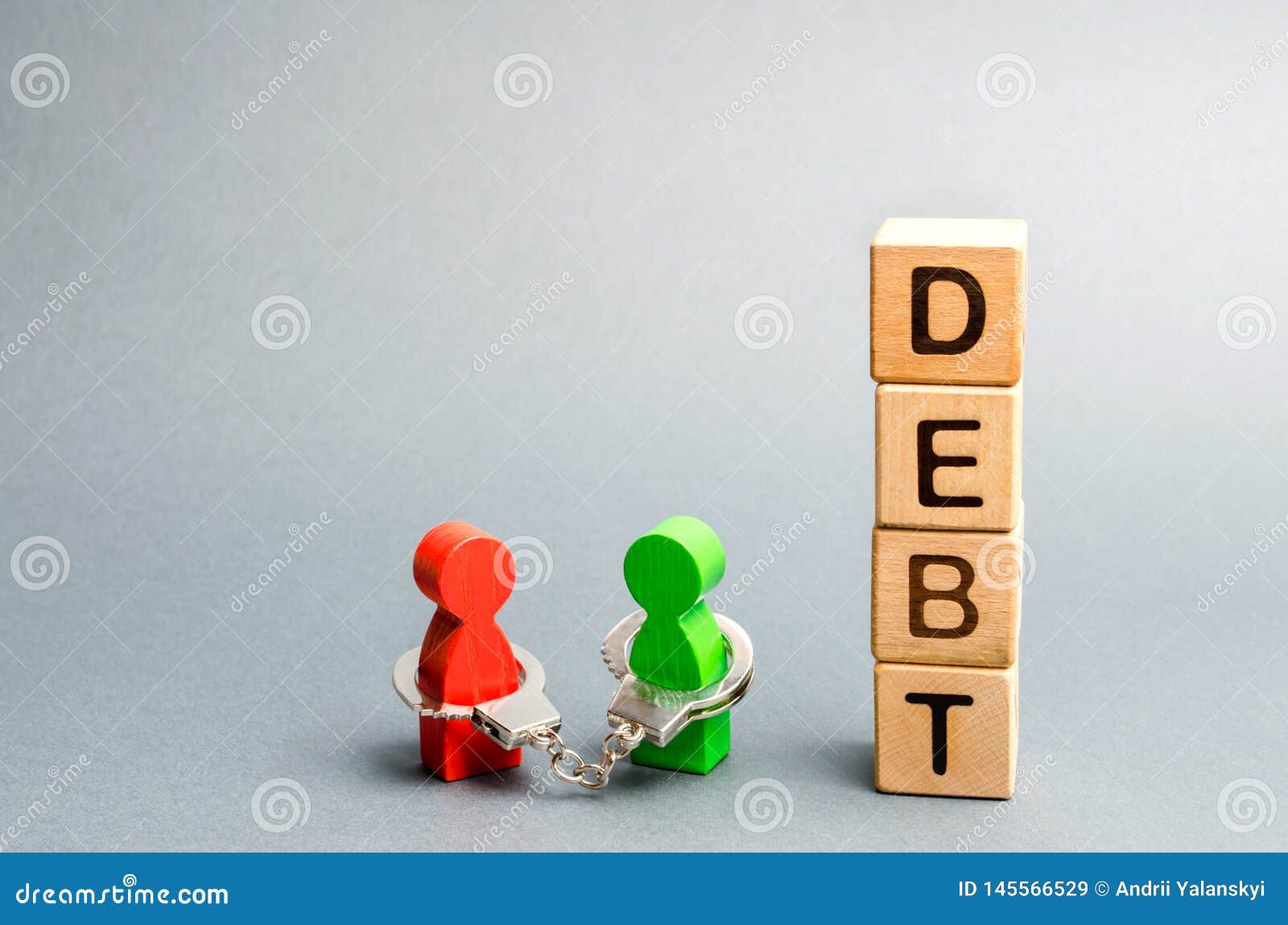 Two People are Bound by Handcuffs with the Word Debt. Creditor and ...
