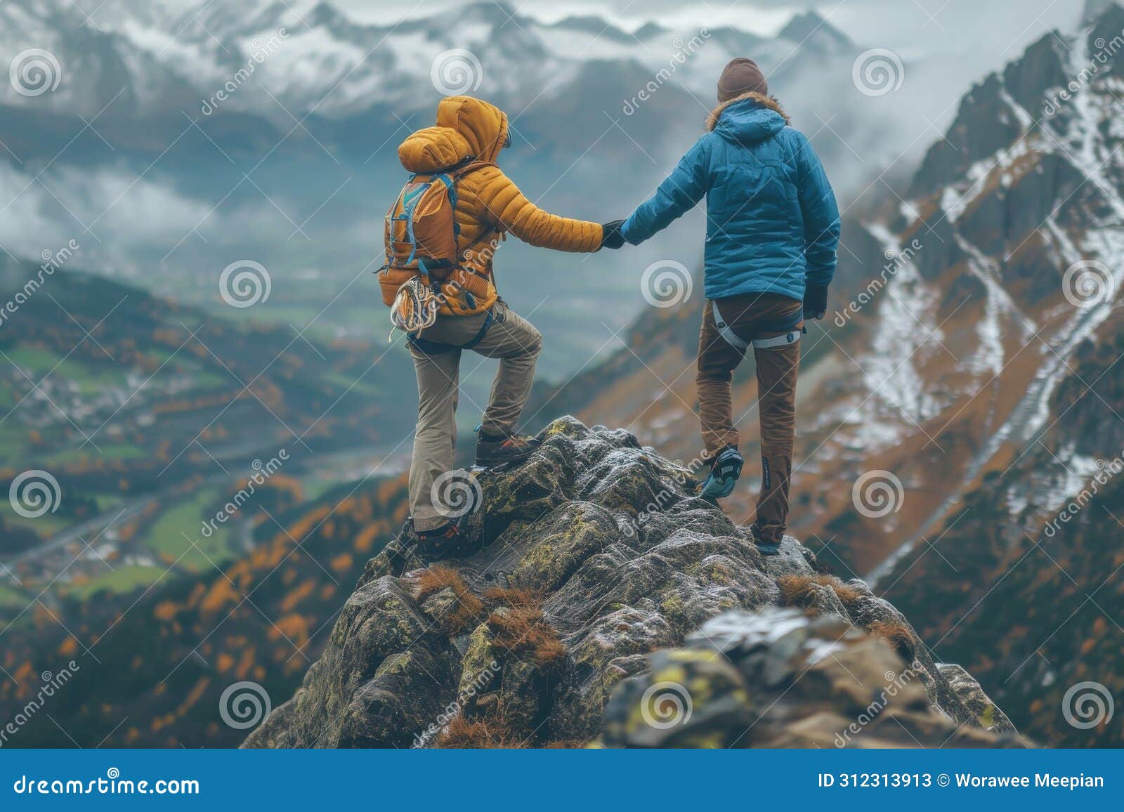 Two People are Climbing a Mountain Together Stock Image - Image of ...