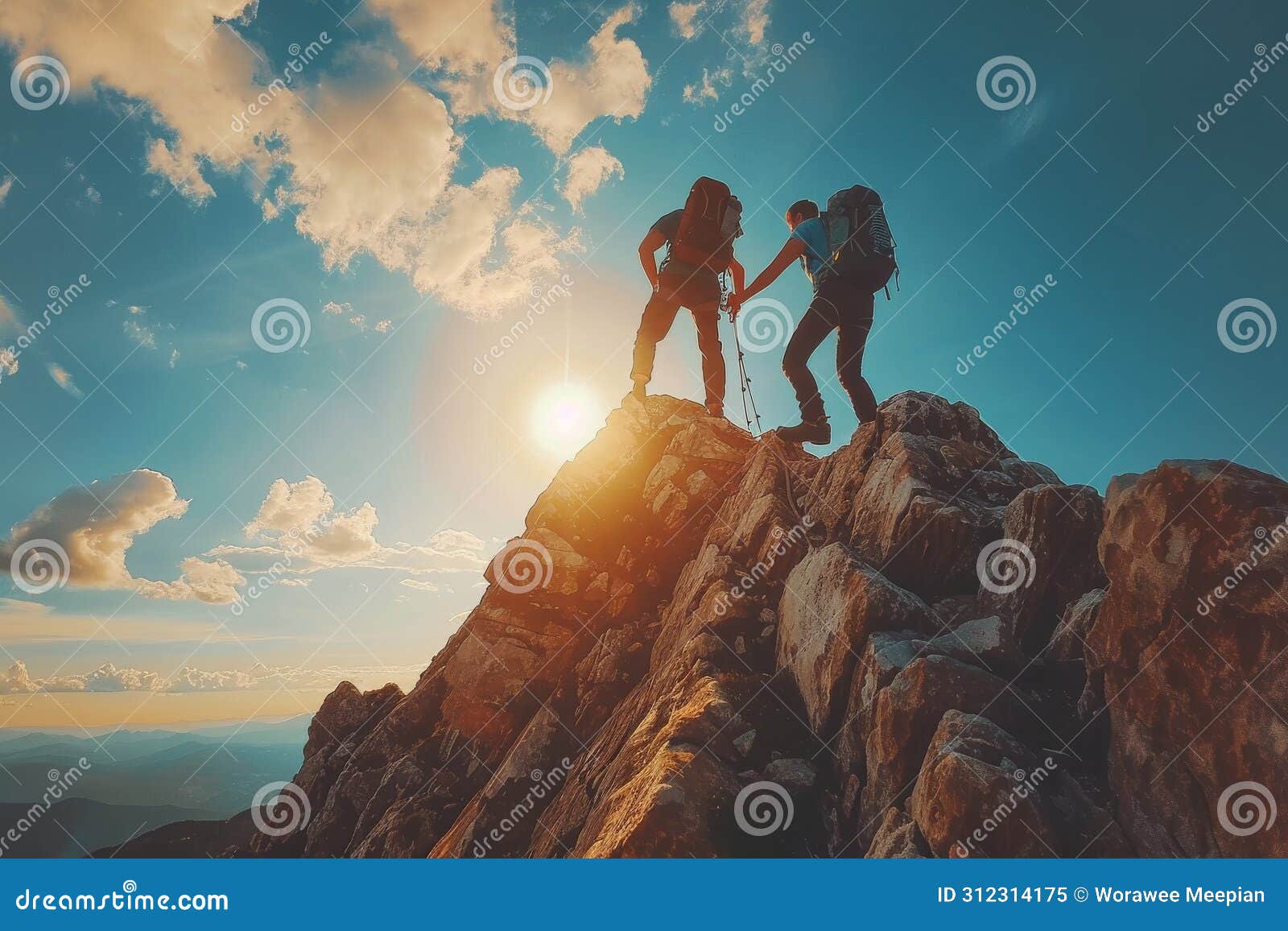 Two People are Climbing a Mountain Together Stock Image - Image of ...