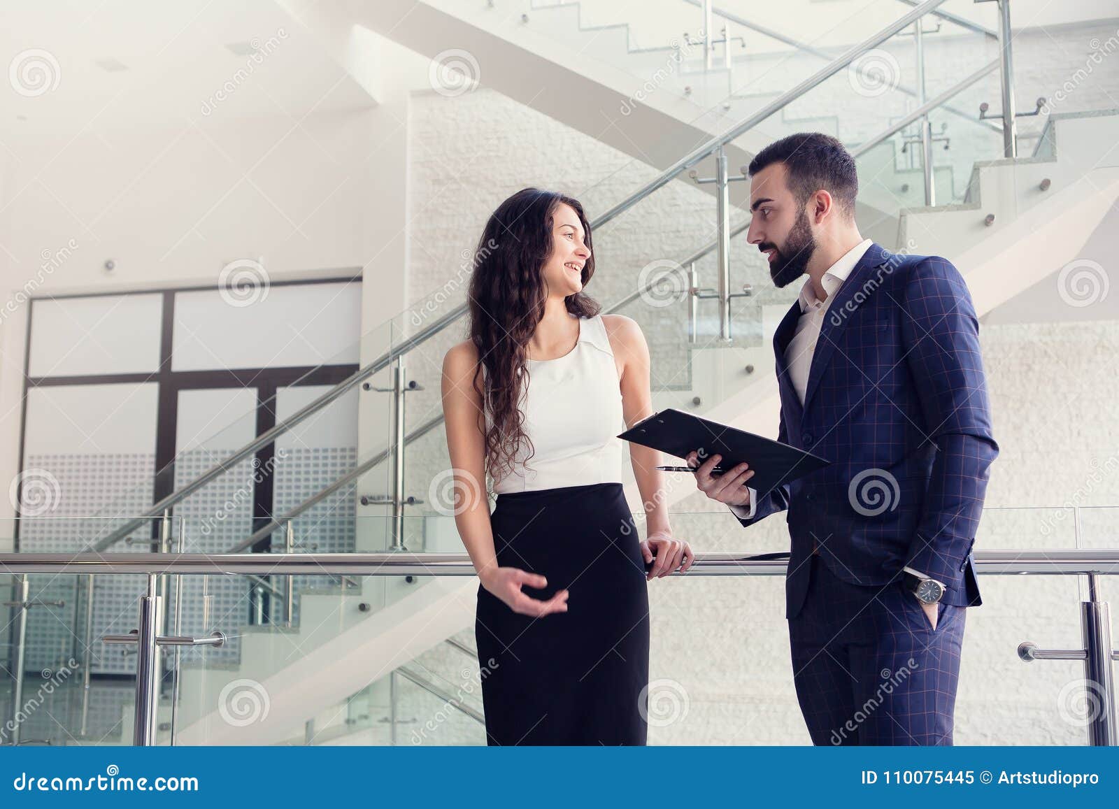 Two Business Colleagues Talk about Work Outside Office. Stock Image ...