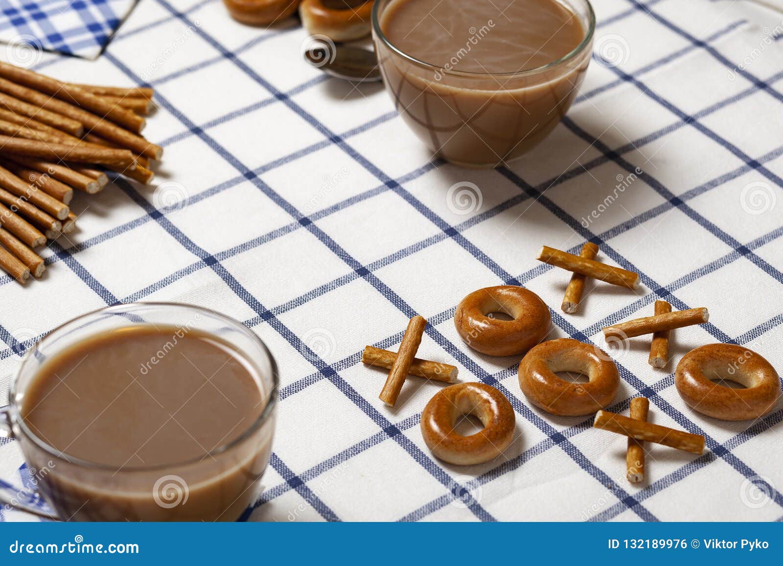 Tic Tac Toe Using Biscuits and Two Cups of Coffee. Selective Focus ...