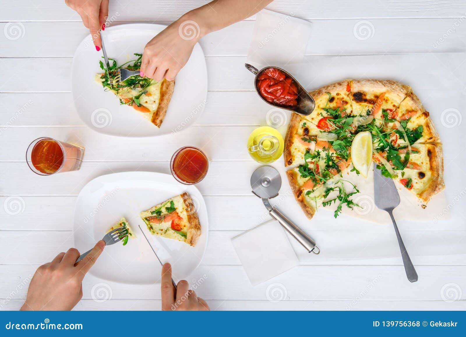 Two People Eats Freshly Cooked Pizza Stock Photo - Image of fast, fish ...