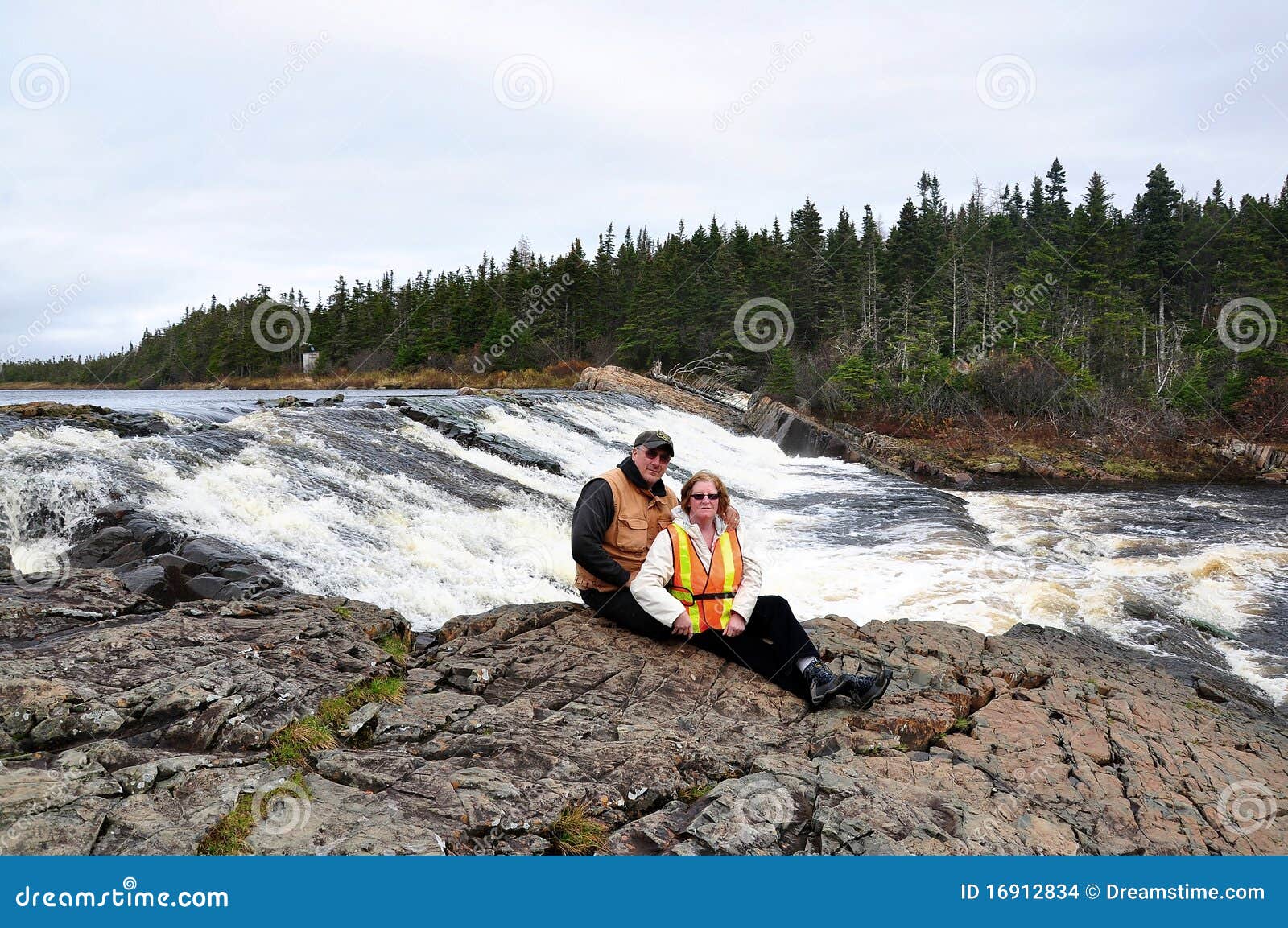 Two People on Edge of Waterfall Stock Photo - Image of fast, hiking ...