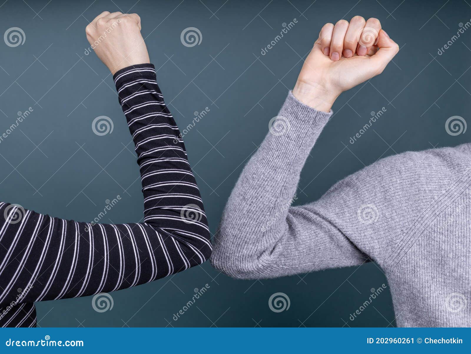 Two People Greeting Each Other with Elbows Stock Image - Image of ...