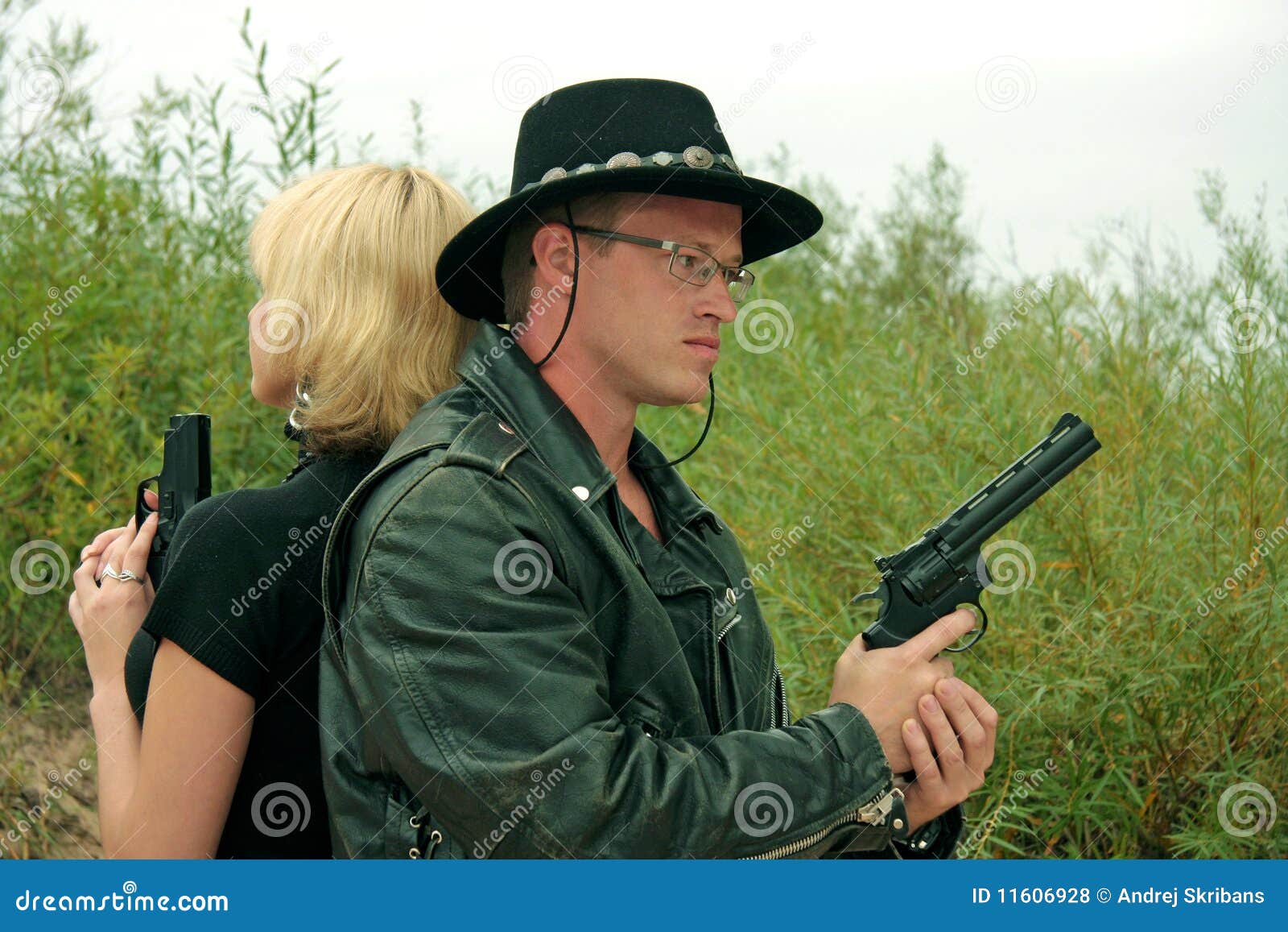 Two people with guns, duel stock photo. Image of blond - 11606928