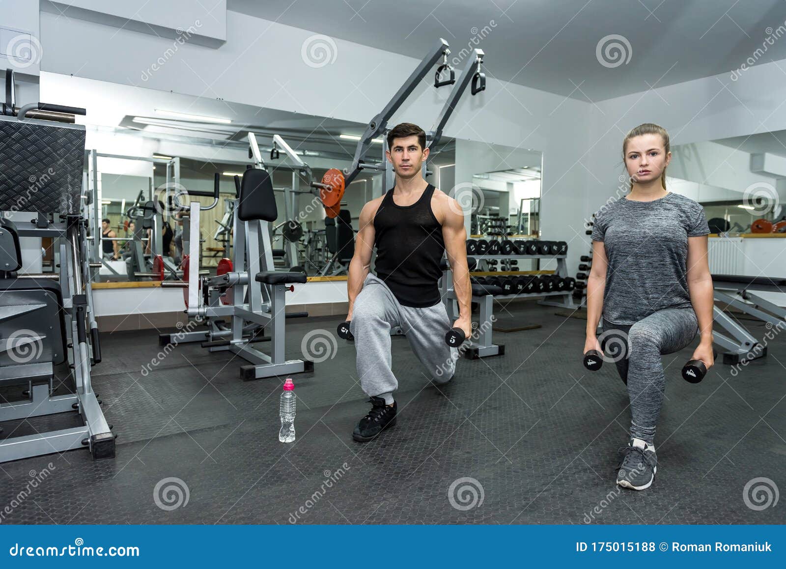 Two People in Gym Making Exercise Together Stock Photo - Image of ...