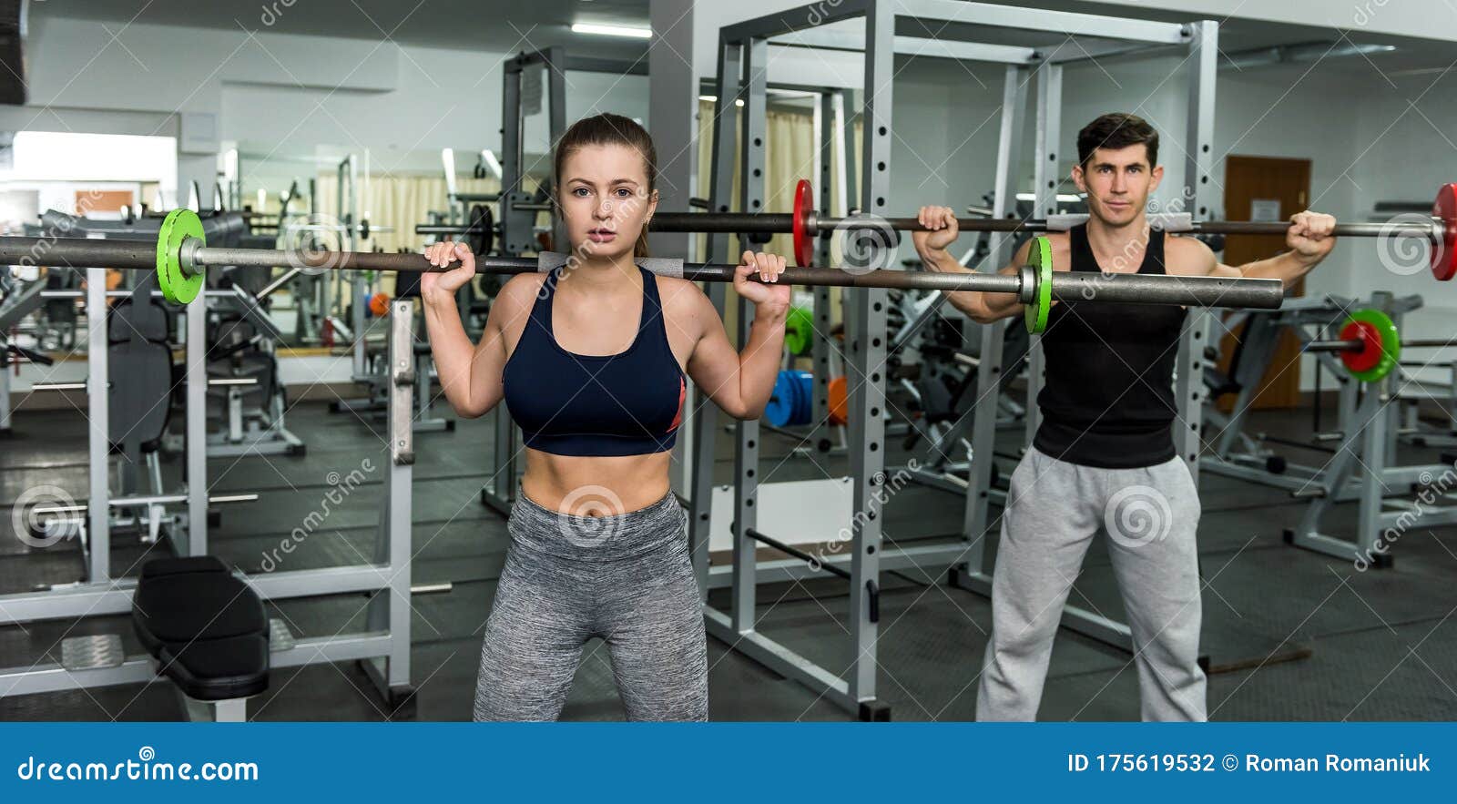 Two People in Gym Making Exercise Together Stock Photo - Image of ...