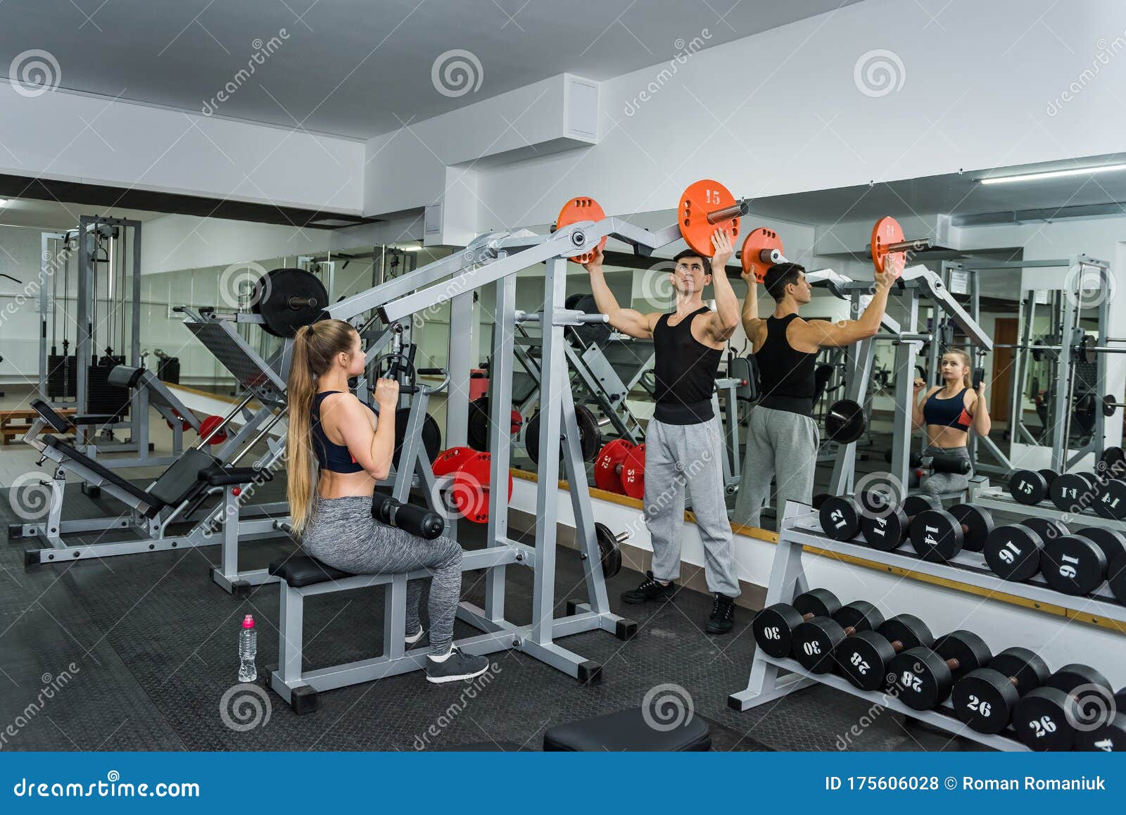 Two People in Gym Making Exercise Together Stock Photo - Image of ...