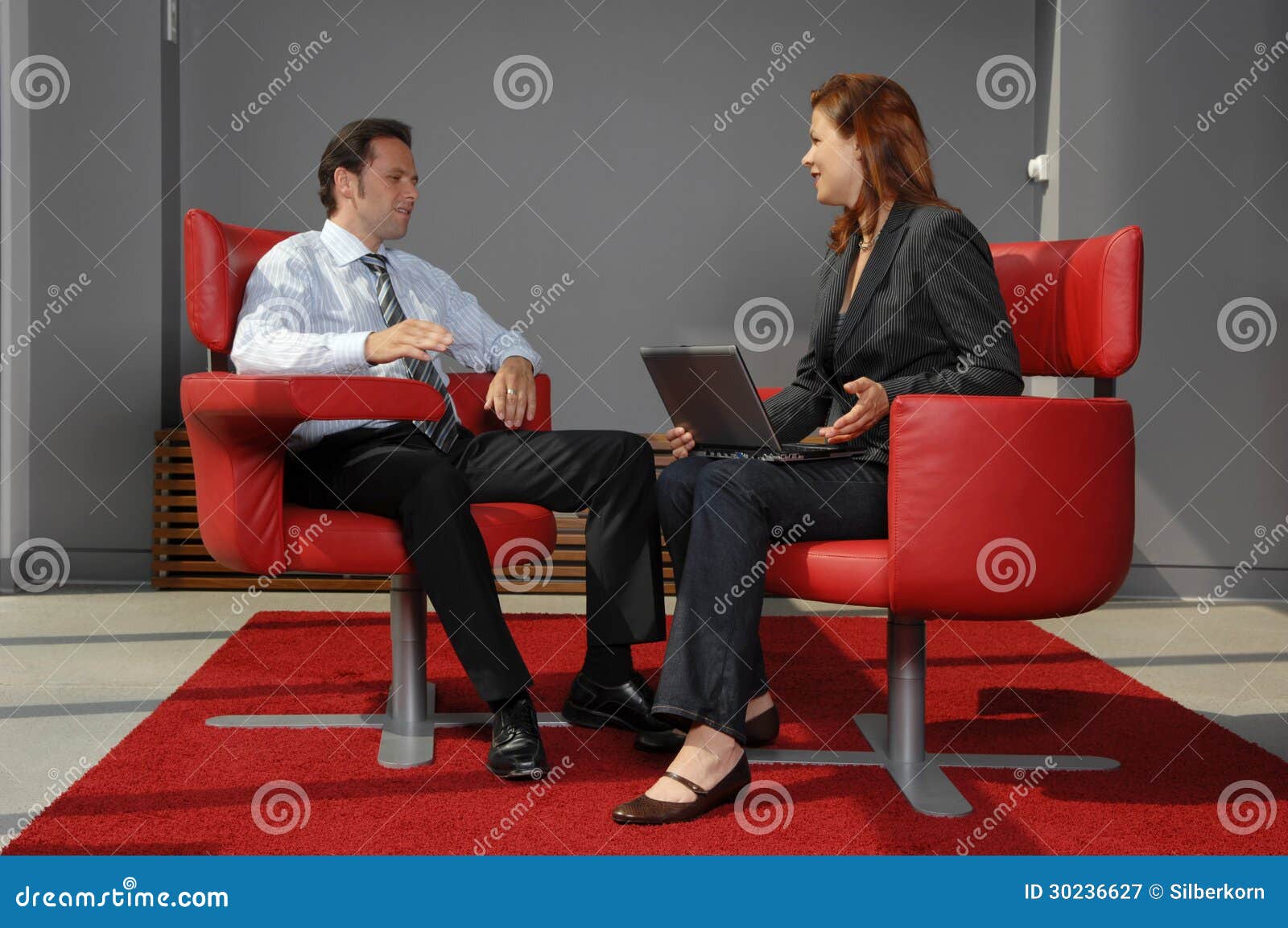 Two People at a Business Meeting Stock Image - Image of contemporary ...