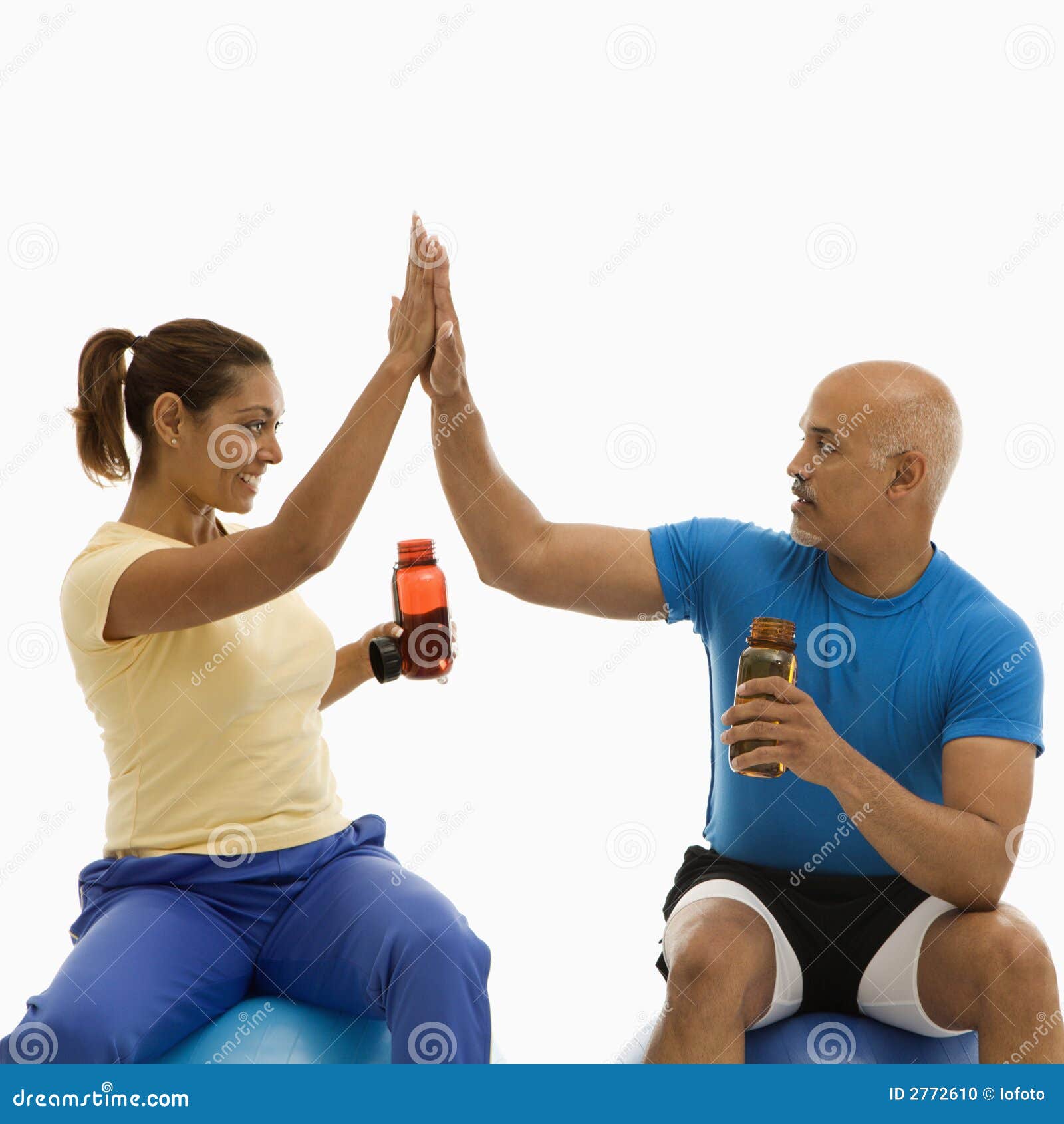 Two people high fiving. stock photo. Image of ball, five - 2772610