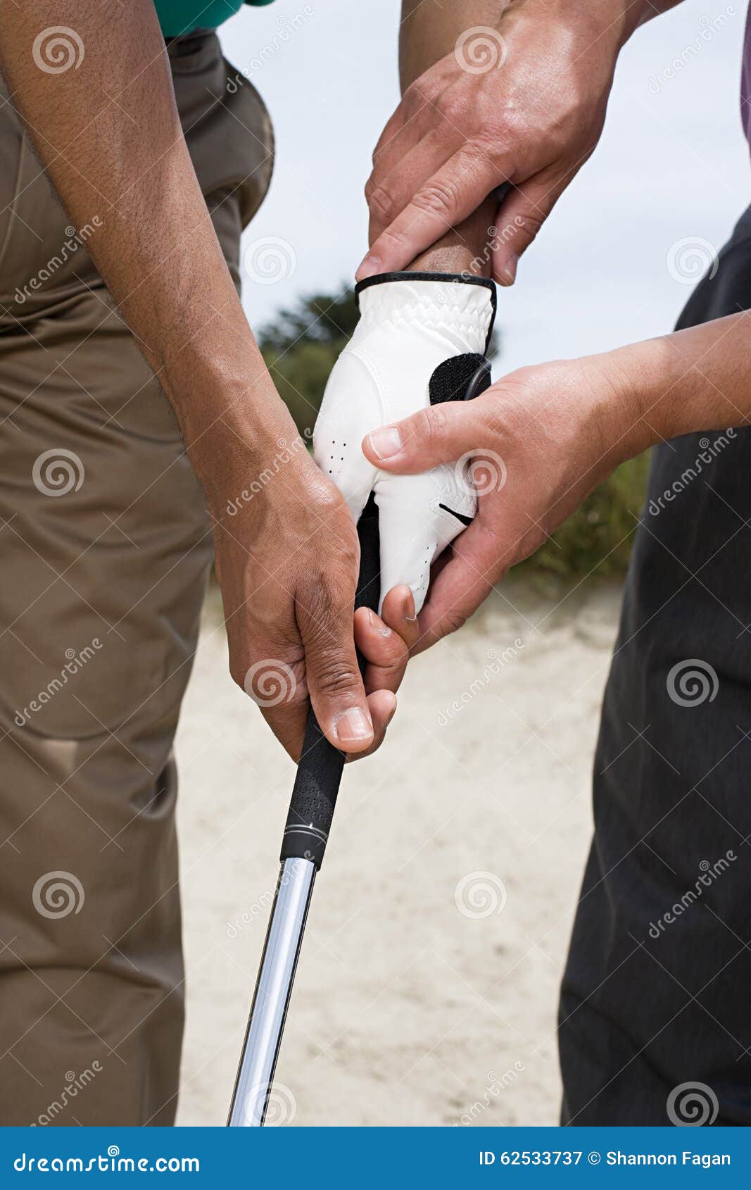 Two People Holding a Golf Club Stock Image - Image of recreation ...