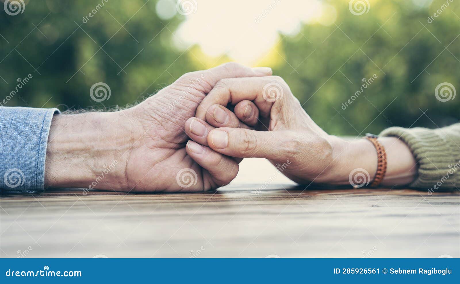 Two People Holding Hands with Compassion and Love Stock Image - Image ...