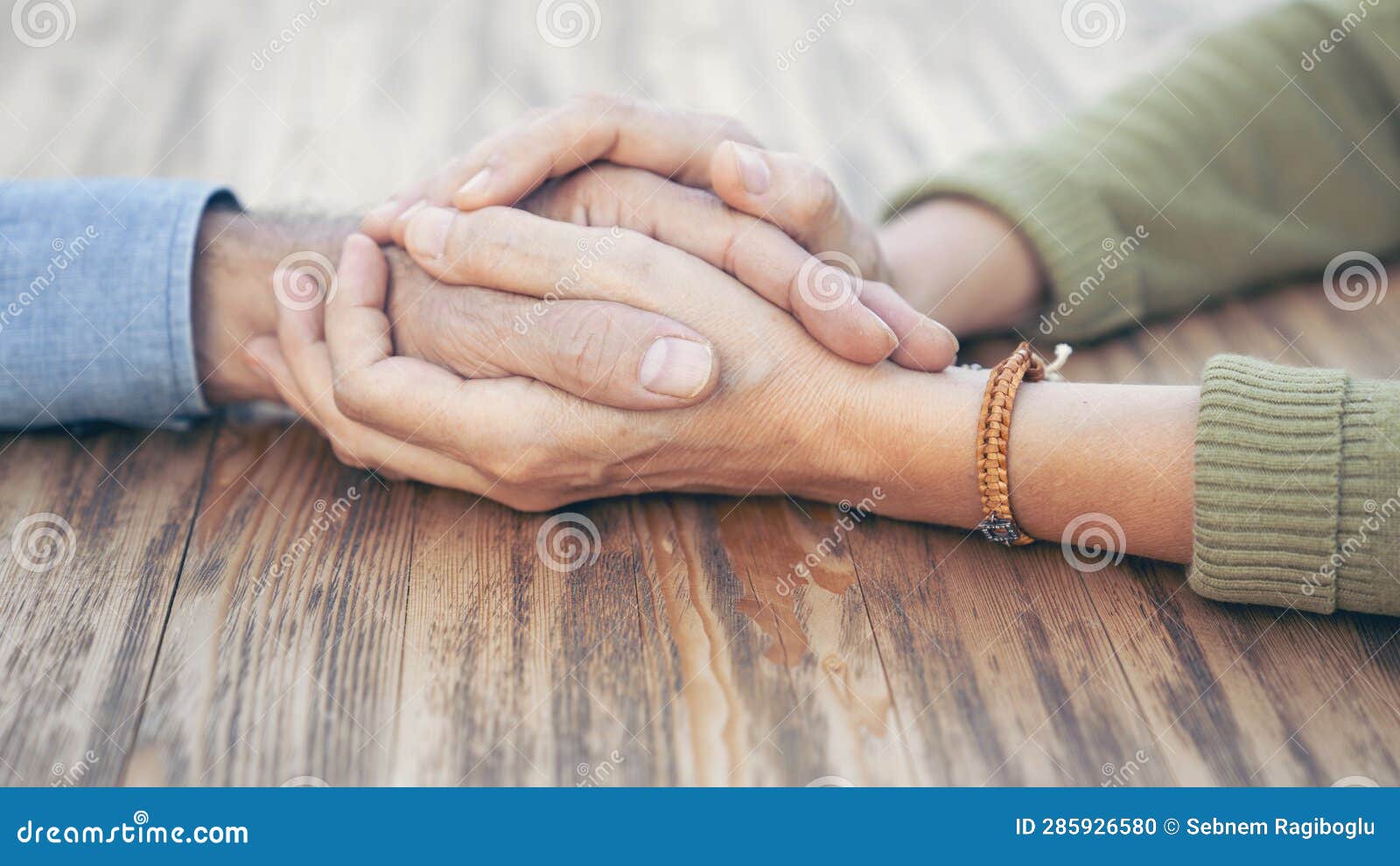 Two People Holding Hands with Compassion and Love Stock Photo - Image ...