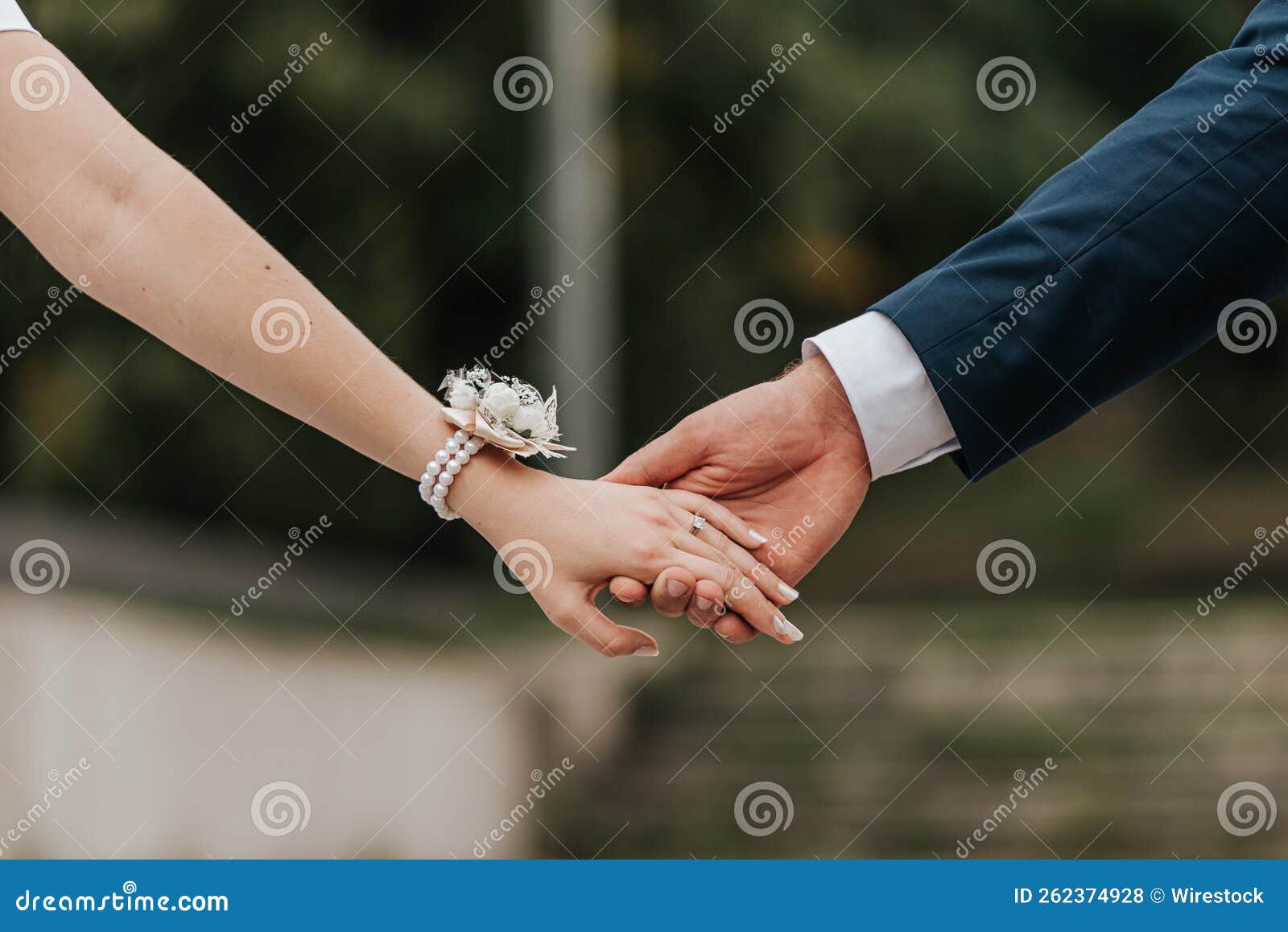 Two People Holding Hands at the Wedding Stock Photo - Image of ...