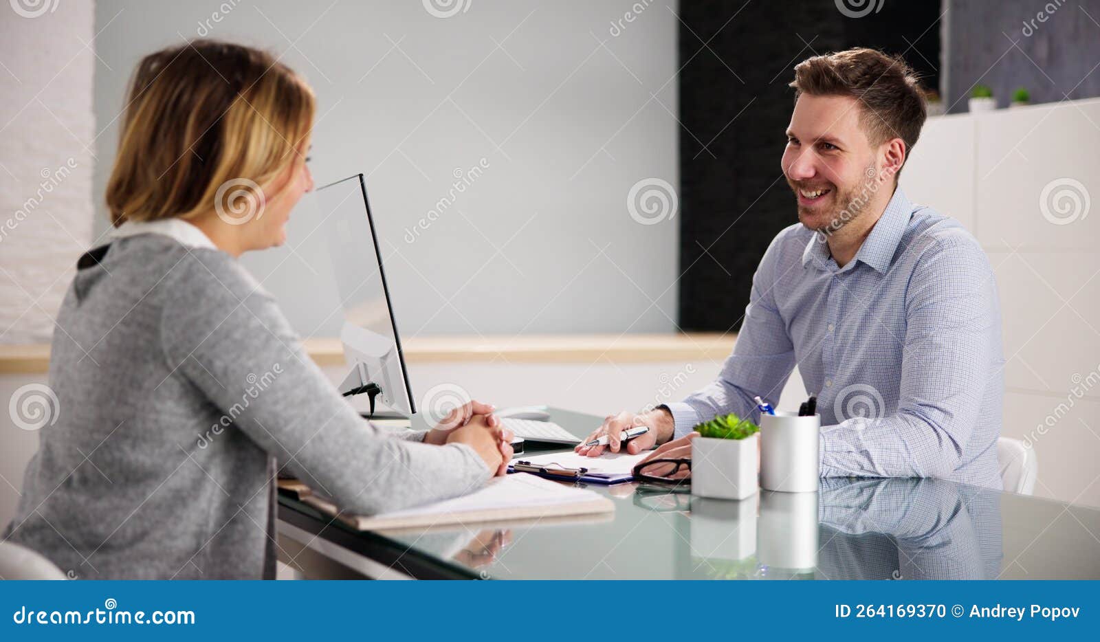Two People At The Interview Sitting On The Sofa Stock Photo ...