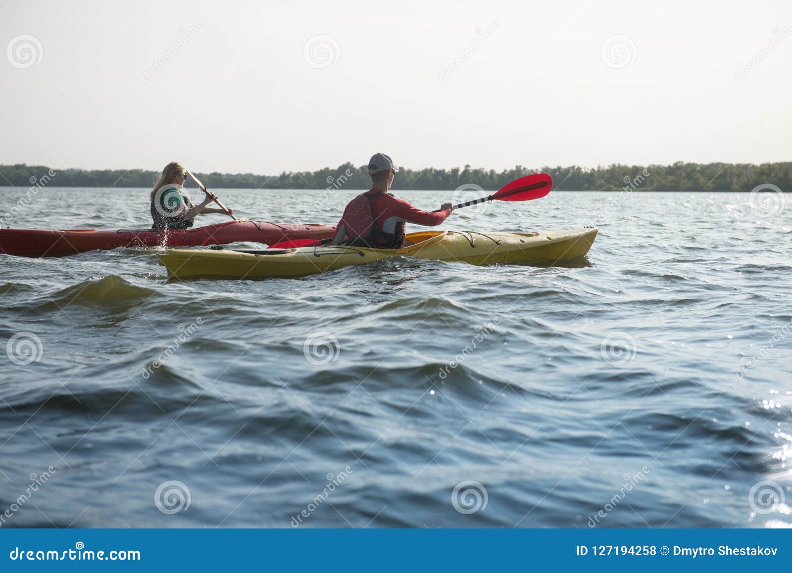 Two People in Kayaks on the River Stock Photo - Image of canoe ...