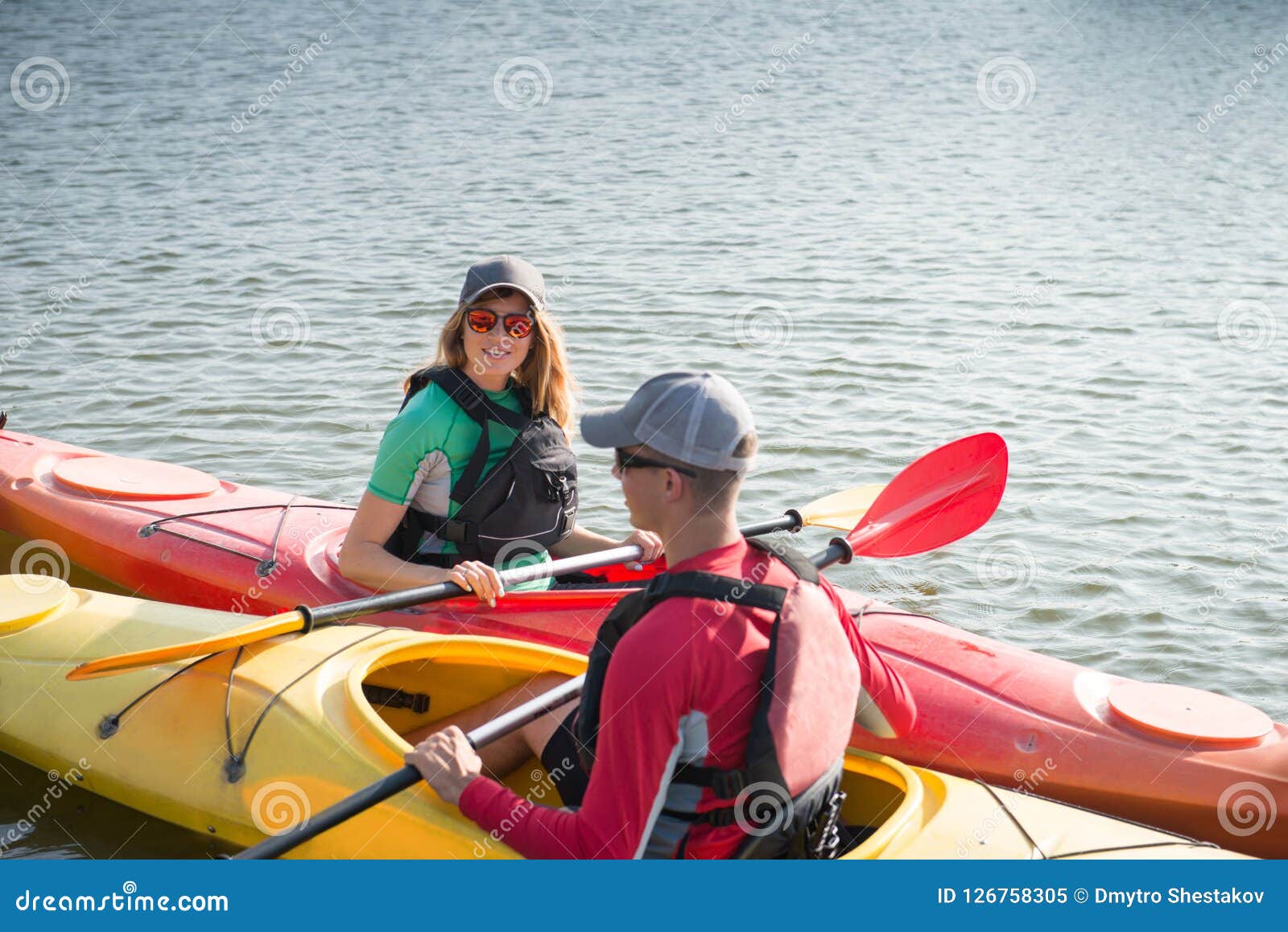 Two People in Kayaks on the River Stock Image - Image of boating ...