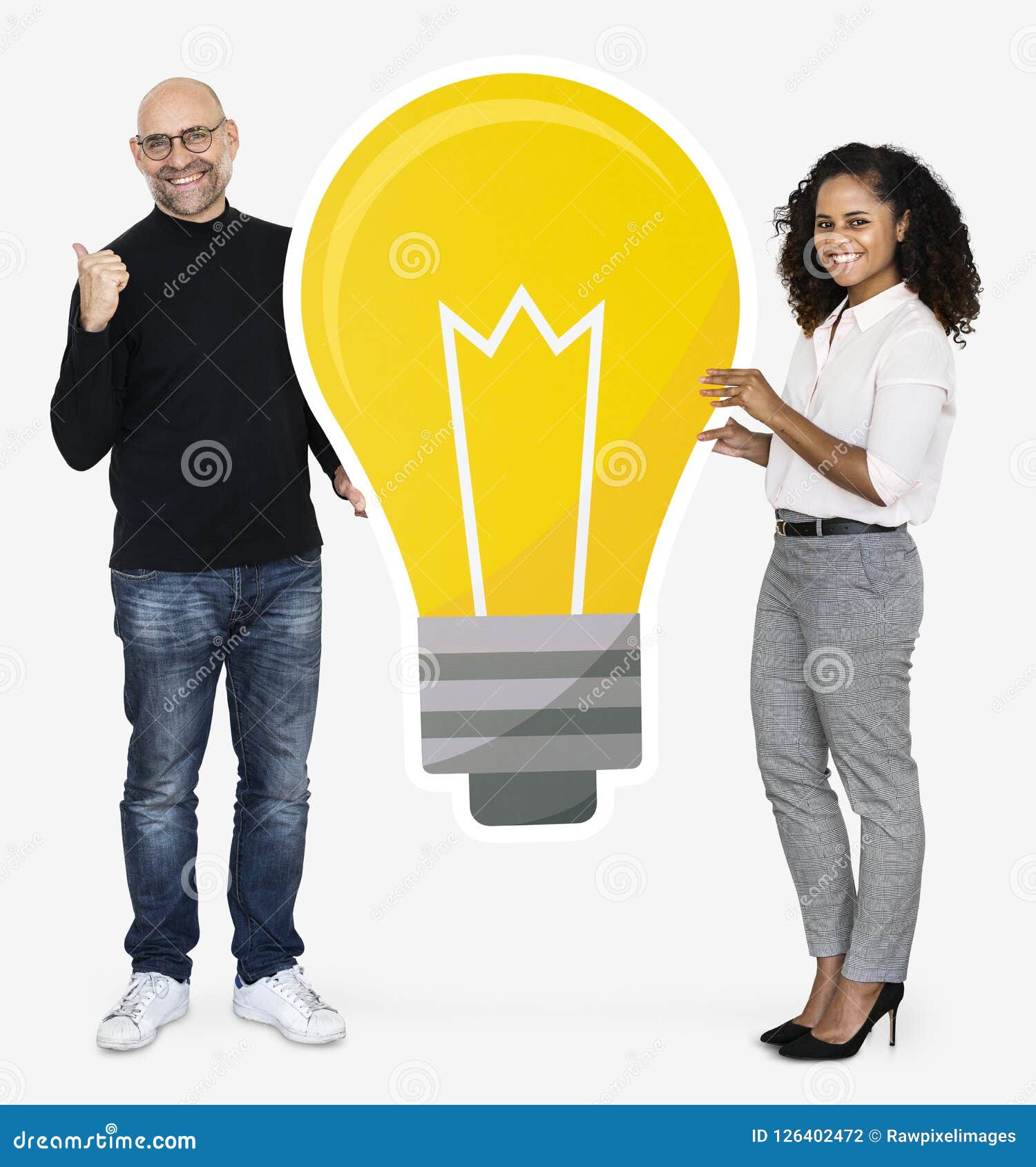 Two People with a Light Bulb Icon Stock Photo - Image of bright, bulb ...