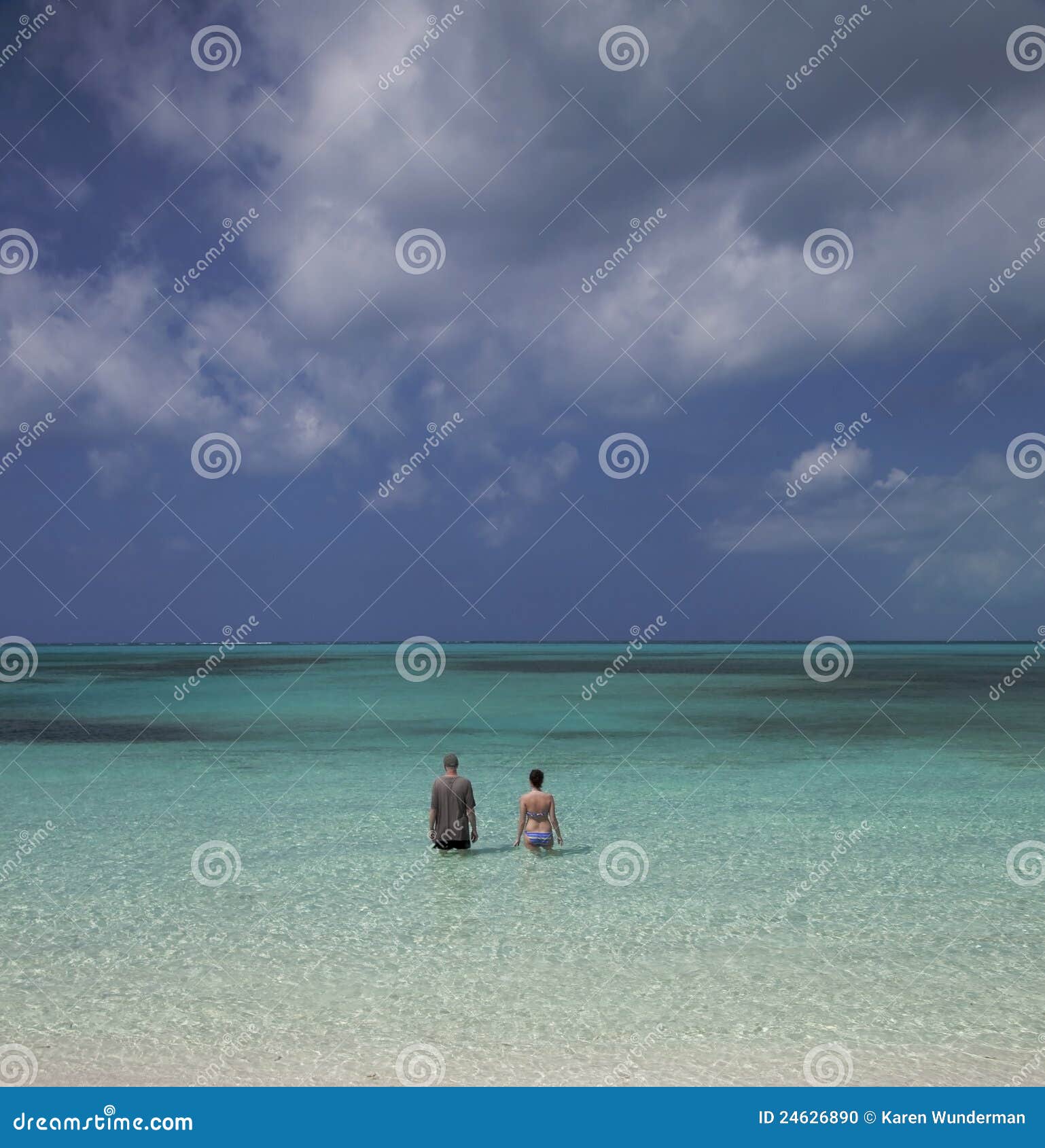 Two People Looking Out at Ocean Stock Photo - Image of water, islands ...