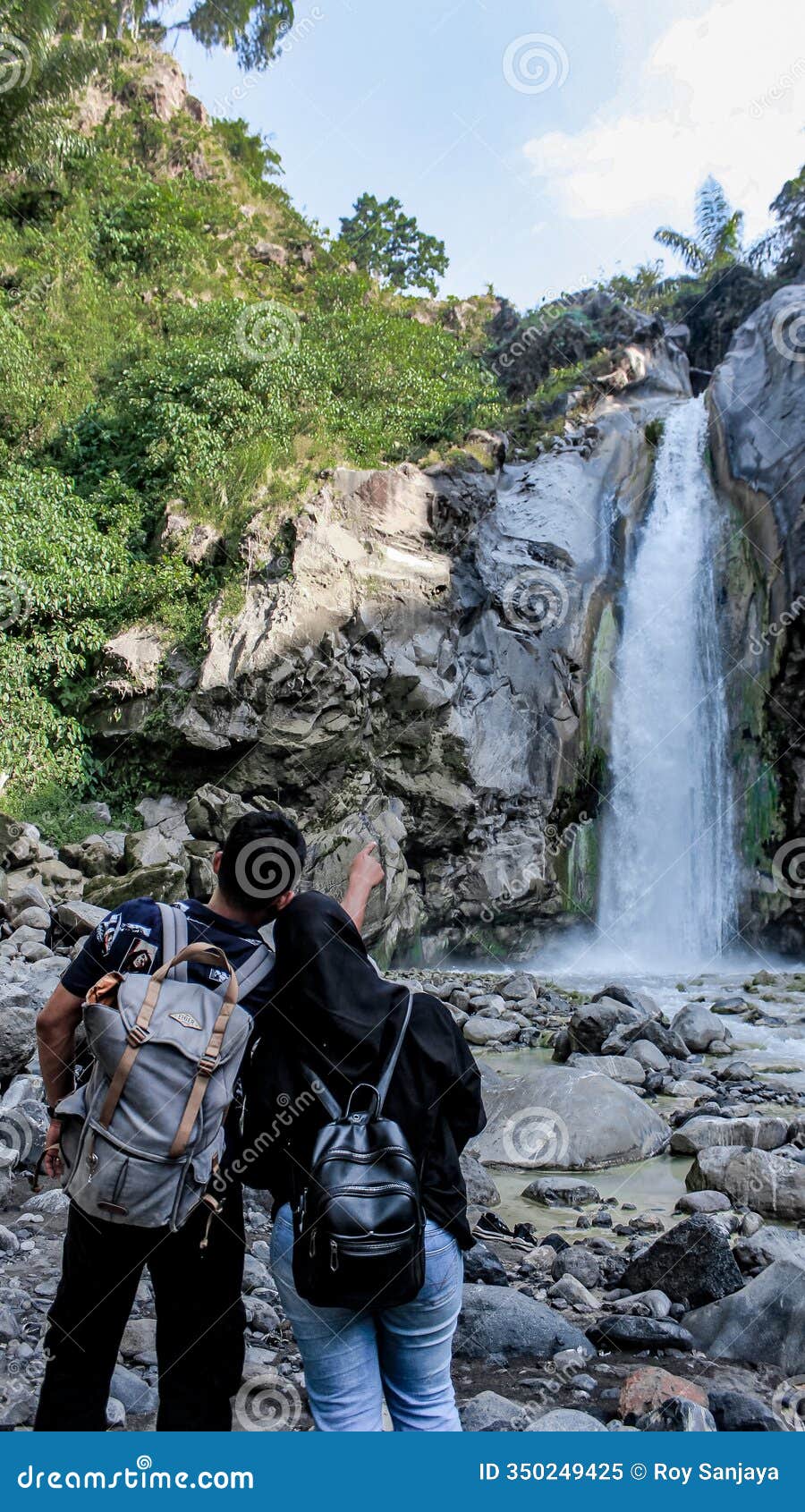 Two People Looking at the Waterfall Editorial Image - Image of ravine ...