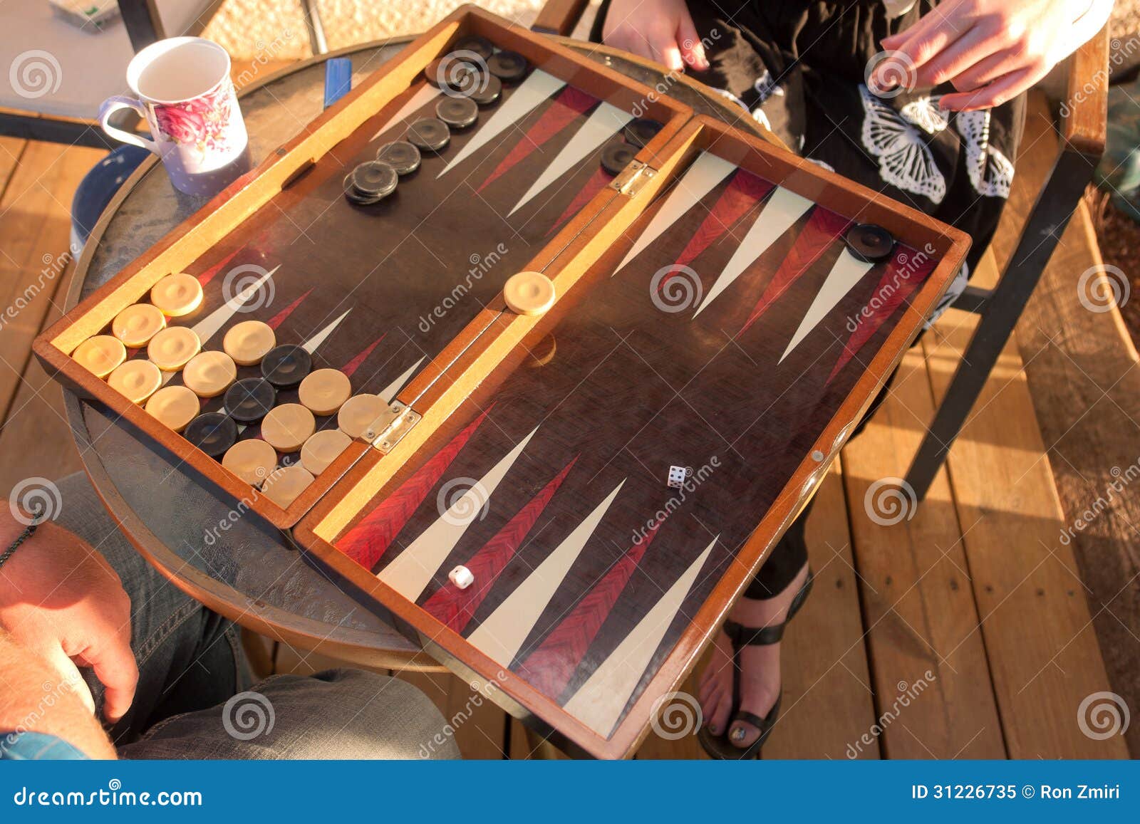Two people play Backgammon stock image. Image of square - 31226735